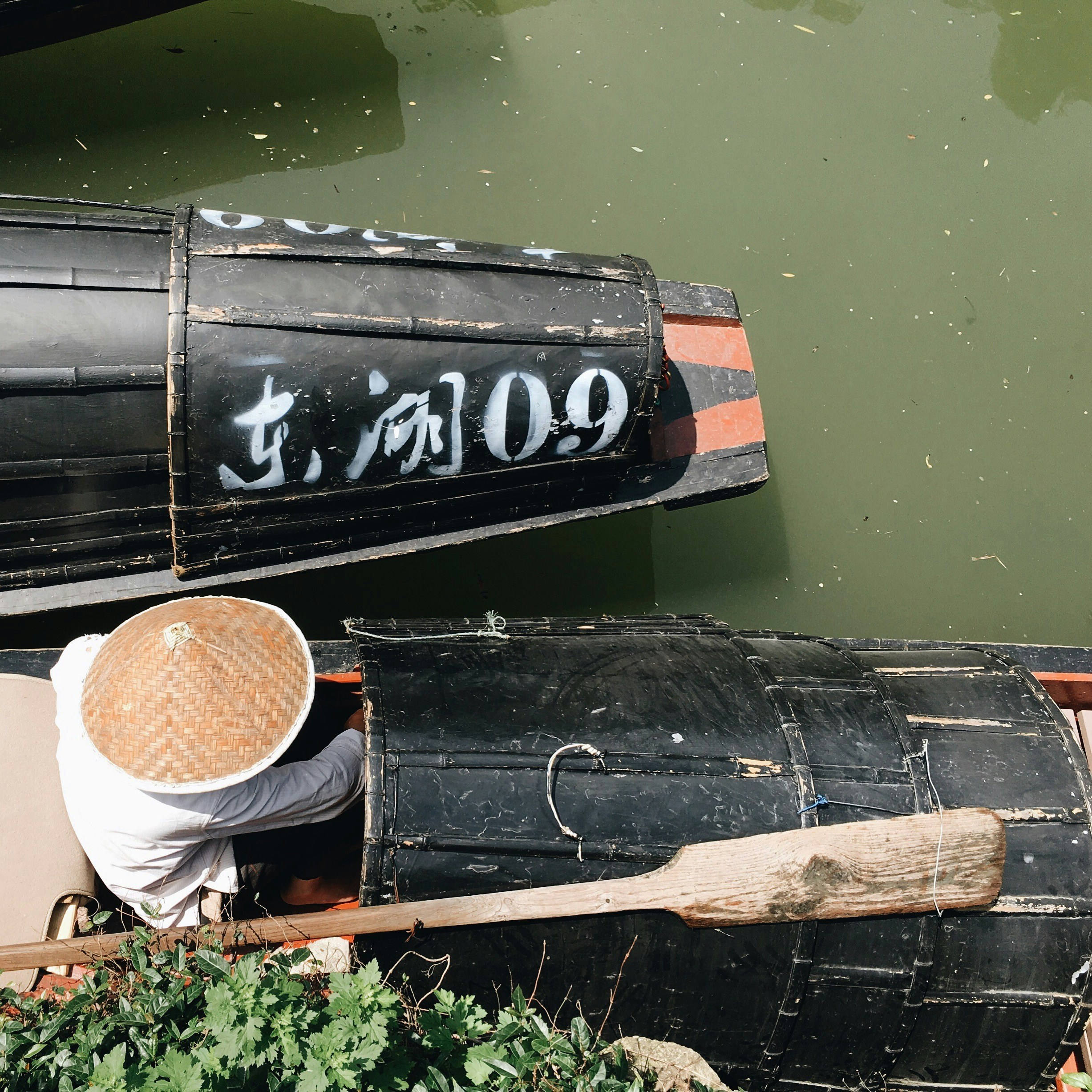 Dark Water and Wooden Sides: A Cargo Barge at Rest