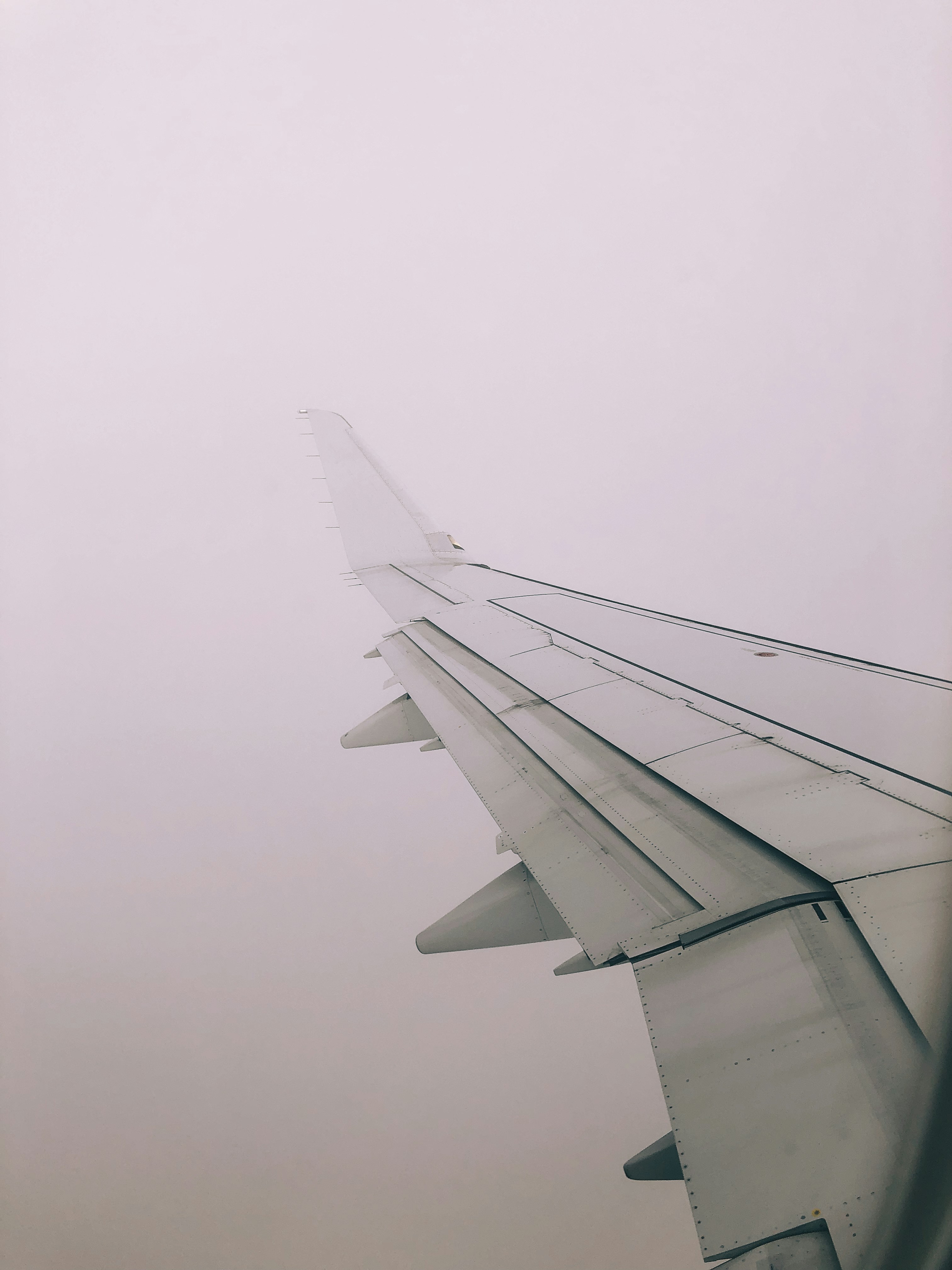 Gray airplane wing photo – Free Travel Image on Unsplash