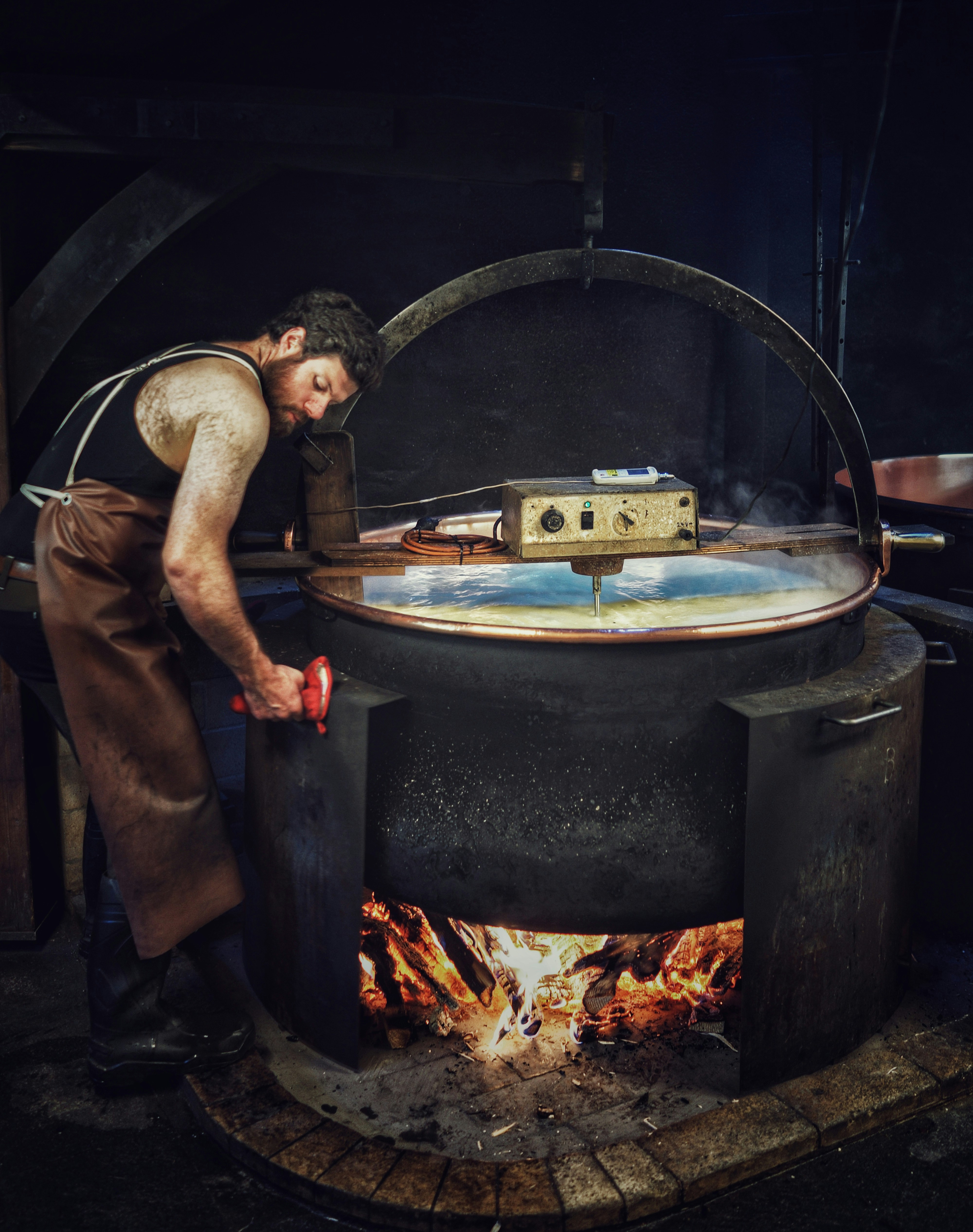 Iron Circle: The Forging Cook in a Dawn-lit Kitchen
