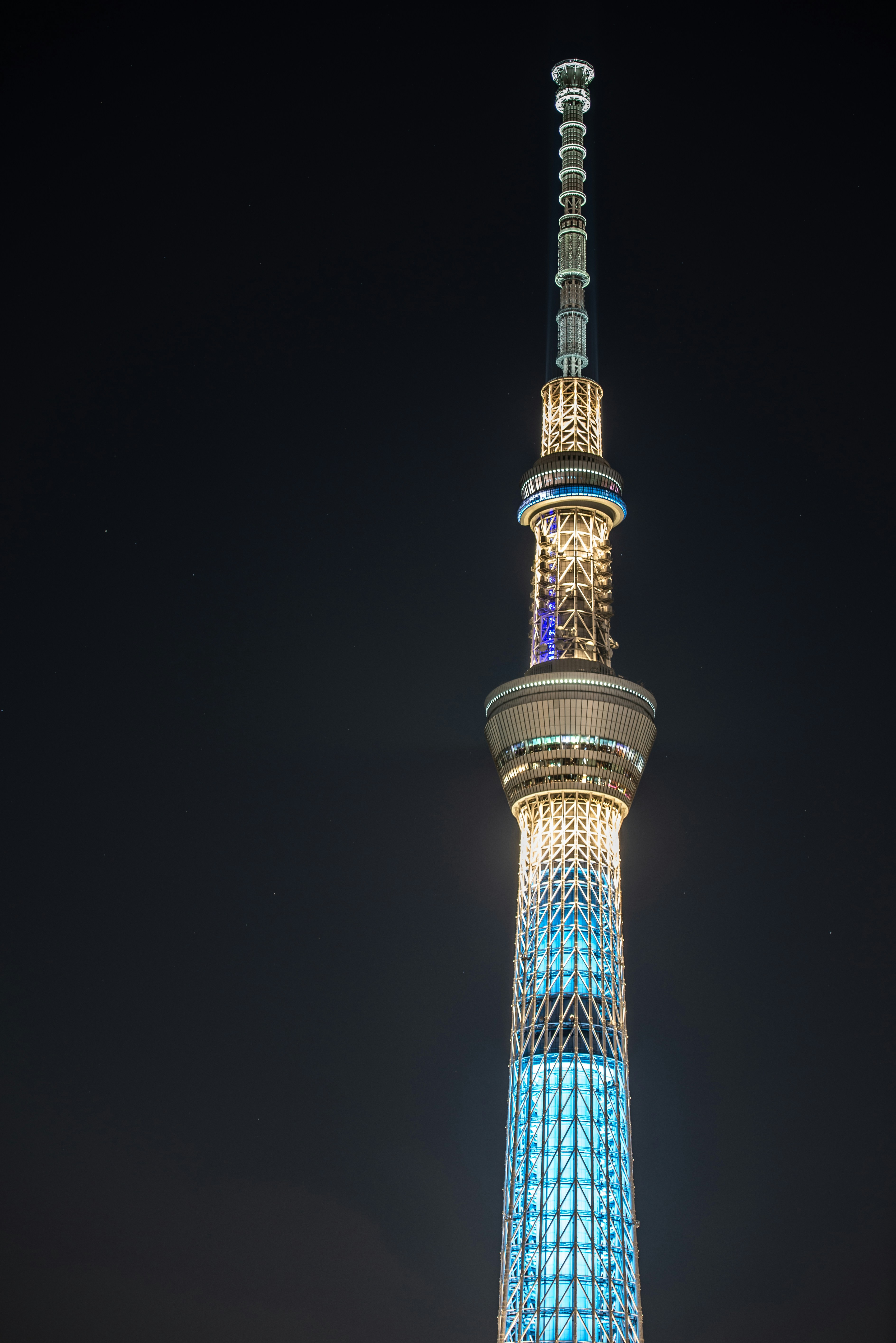 Illuminated Pinnacle: A Modern Marvel in the Night Sky