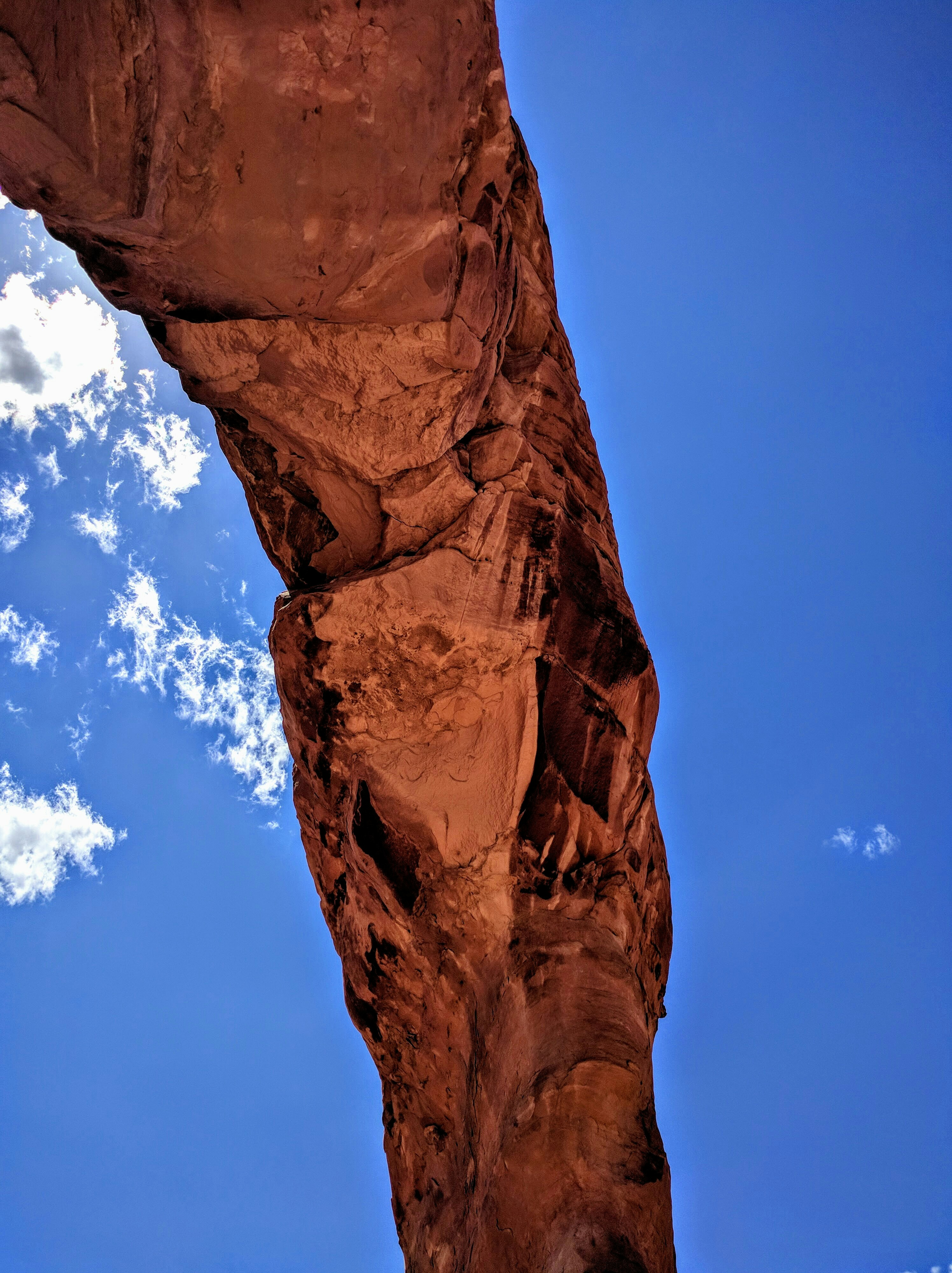 Crimson Monolith Piercing the Cerulean Sky