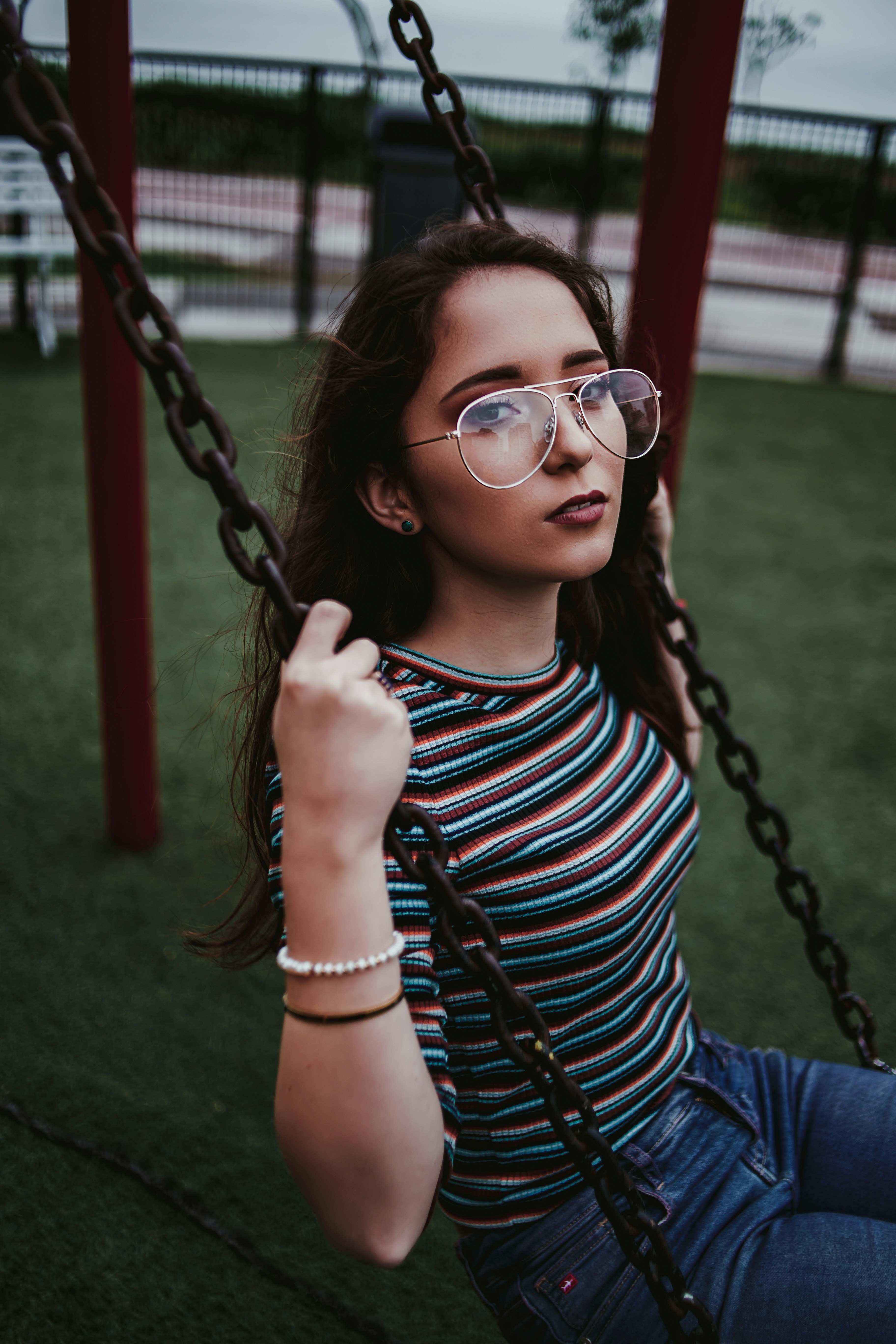 Woman sits on swing photo – Free Peru Image on Unsplash