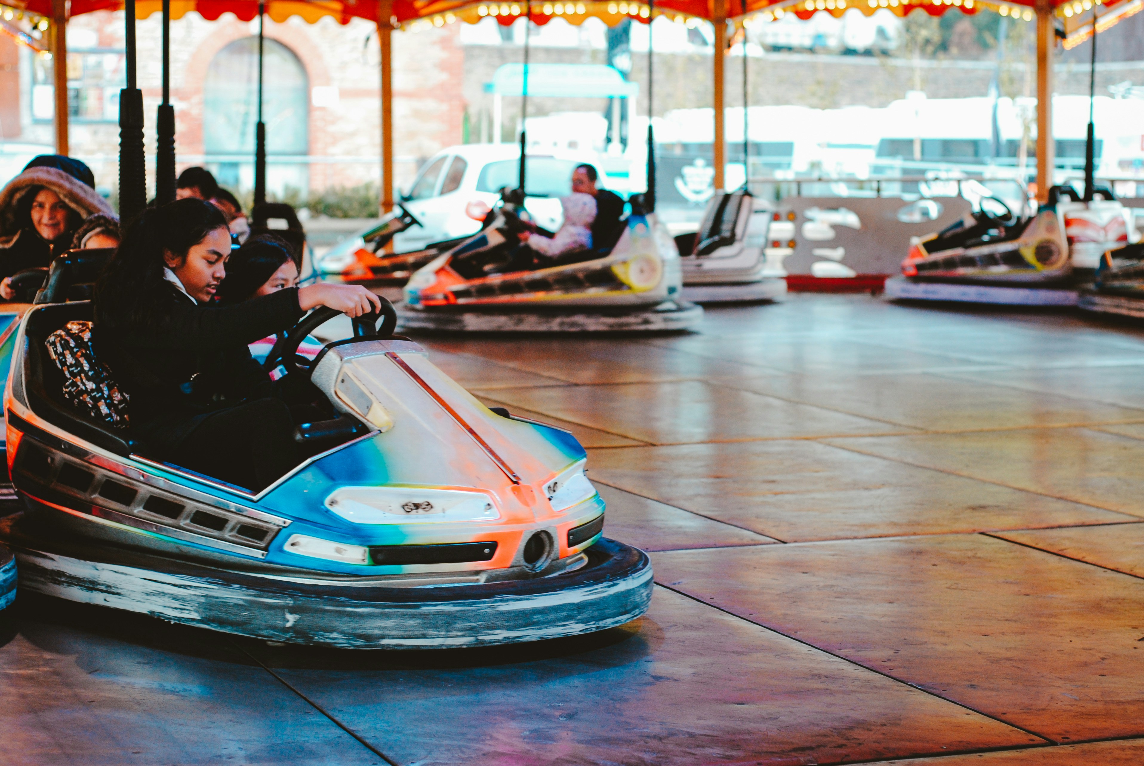 Blue bump car photo – Free Person Image on Unsplash