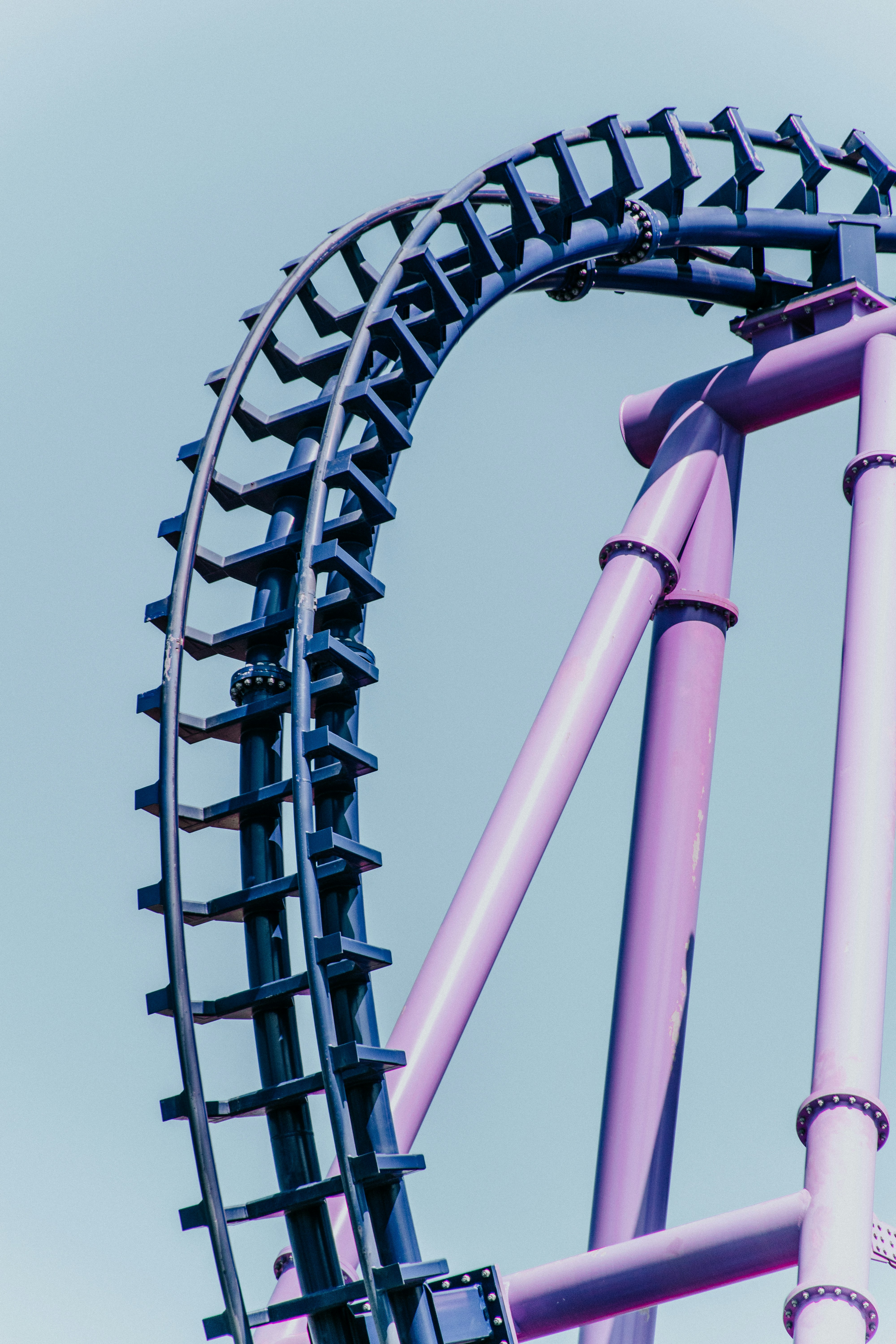 Looping Steel: A Neon-Tinted Rollercoaster Arc
