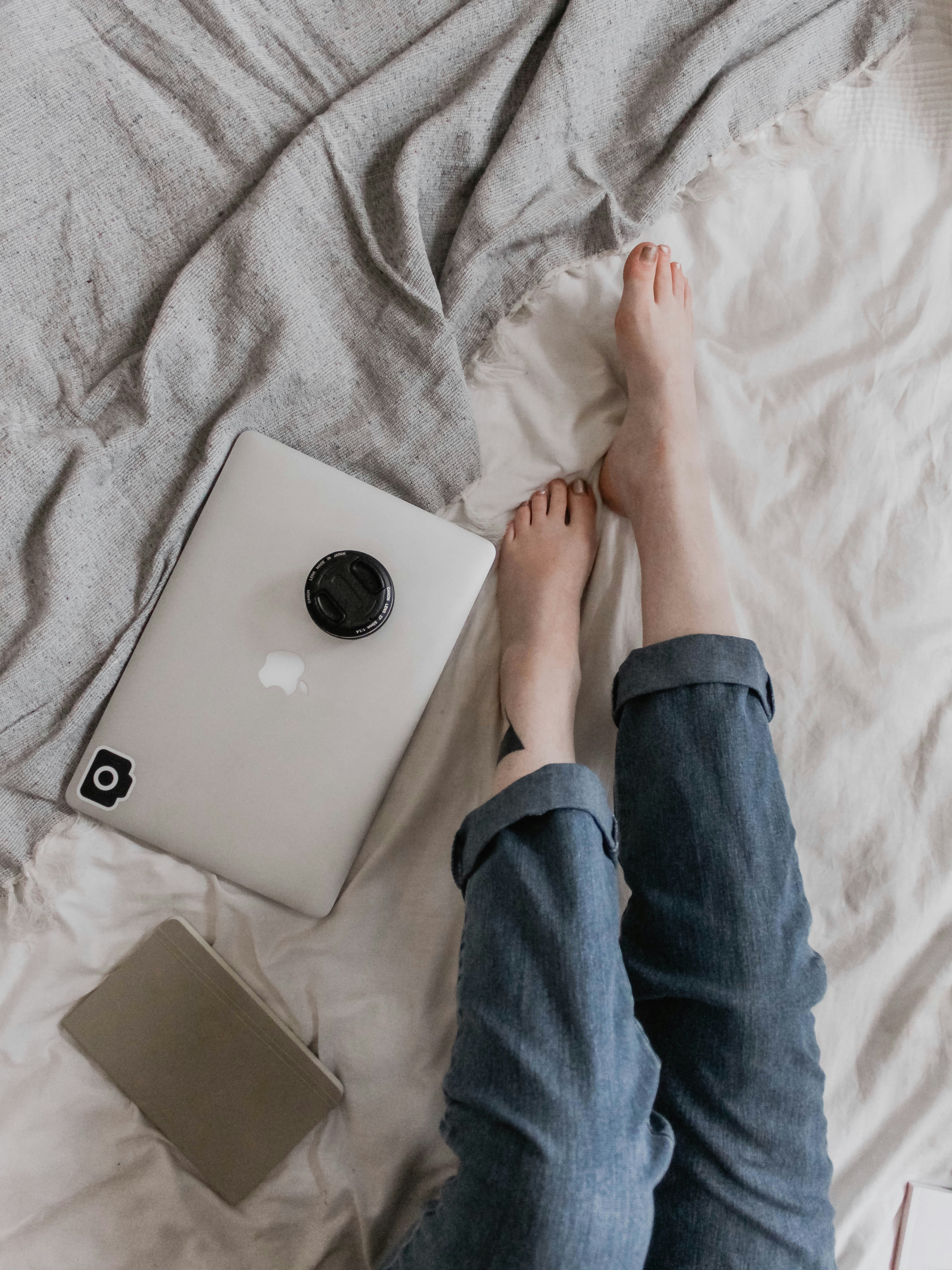 Footfalls on a Quiet Morning: A Laptop, Bud, and Denim Pause