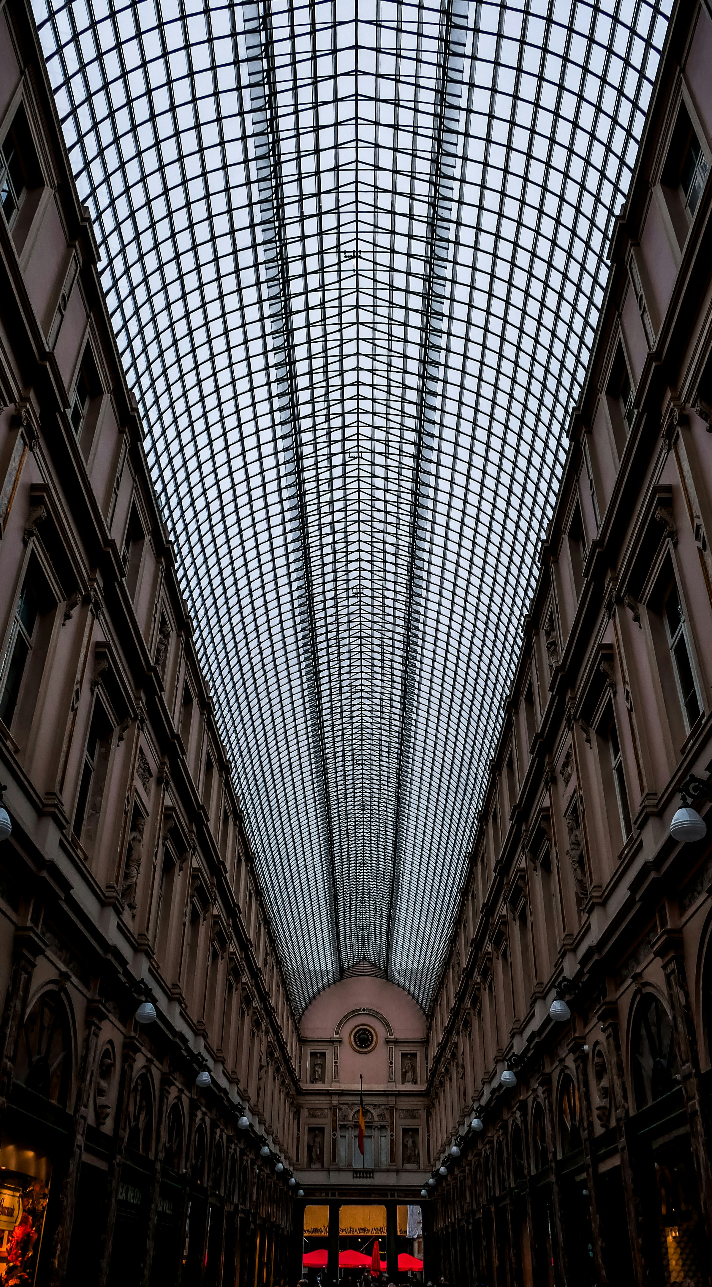 Through the Glass Vault: Symmetry at the End of a Grand Arcade
