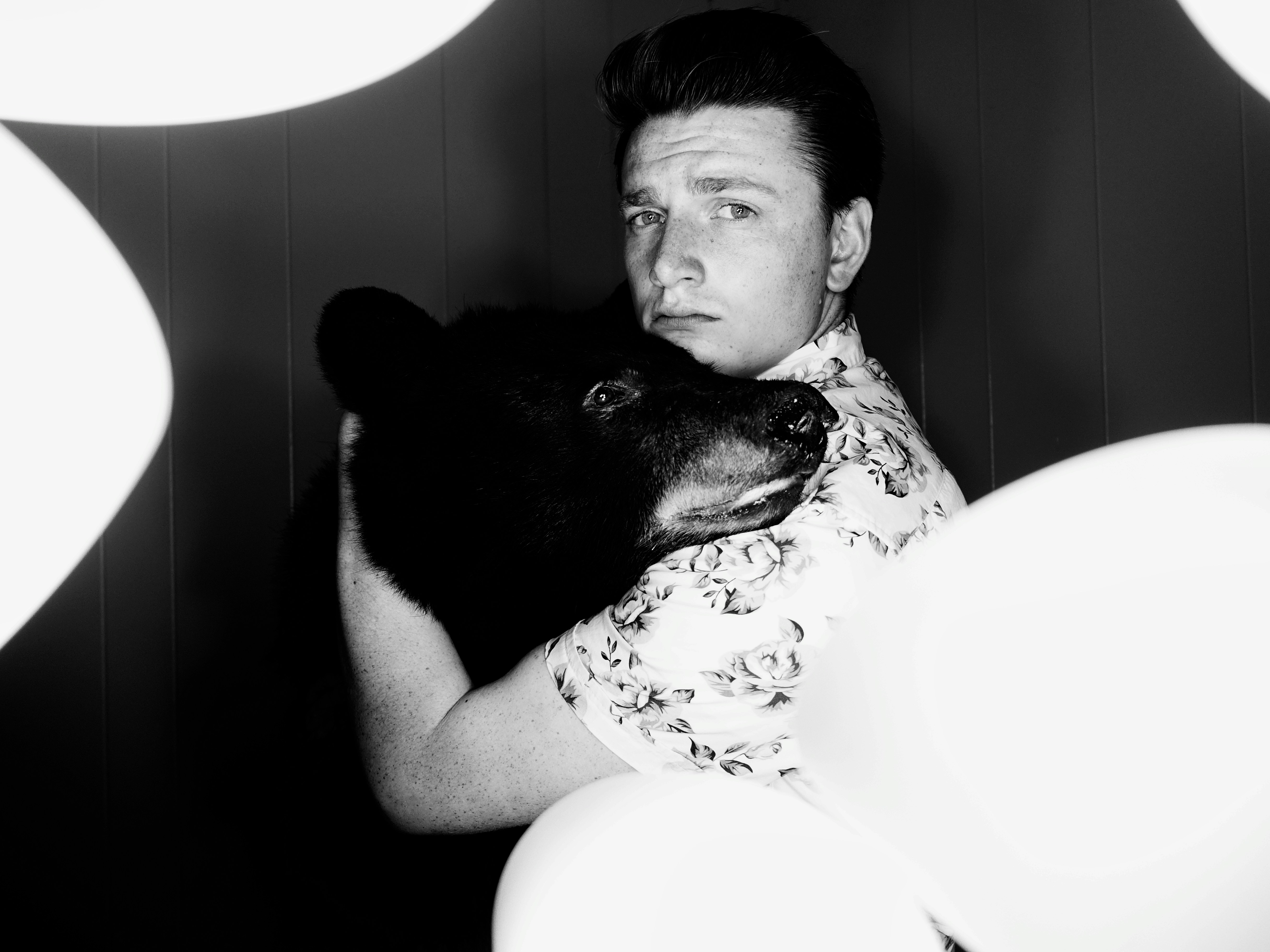 Bear Hug | man hugging bear