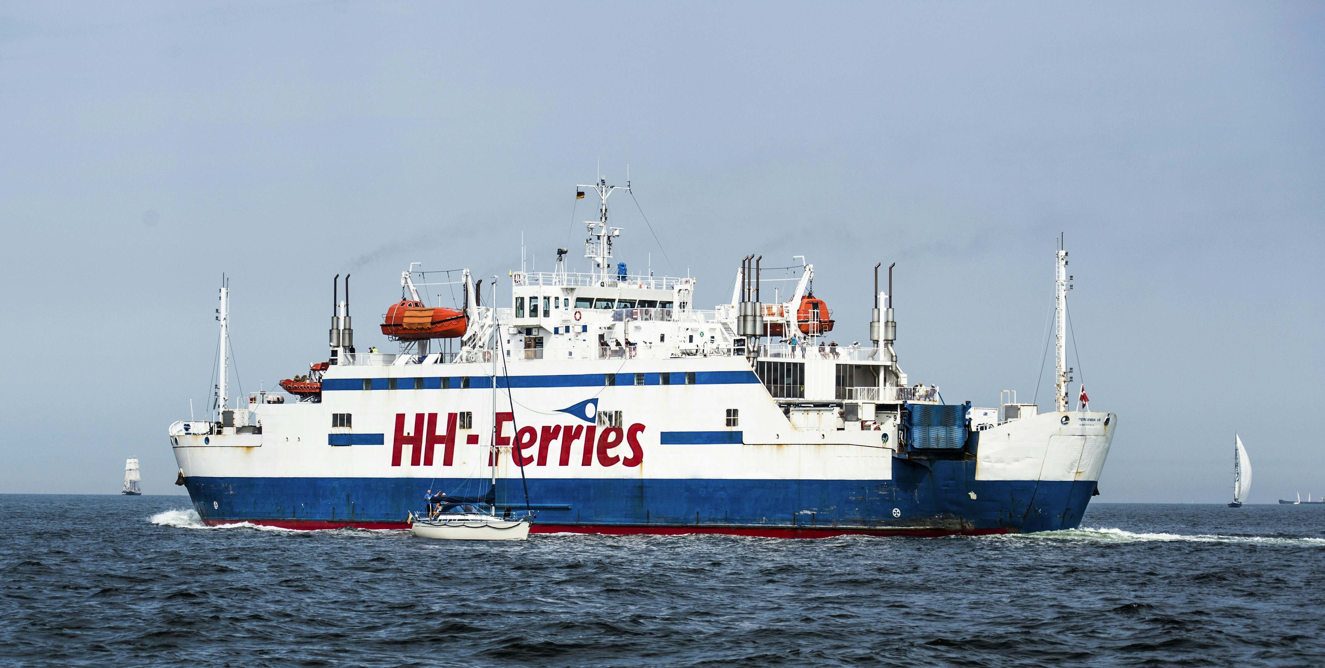 Calm Passage: The HH Ferries Vessel on a Blue Atlantic Wake