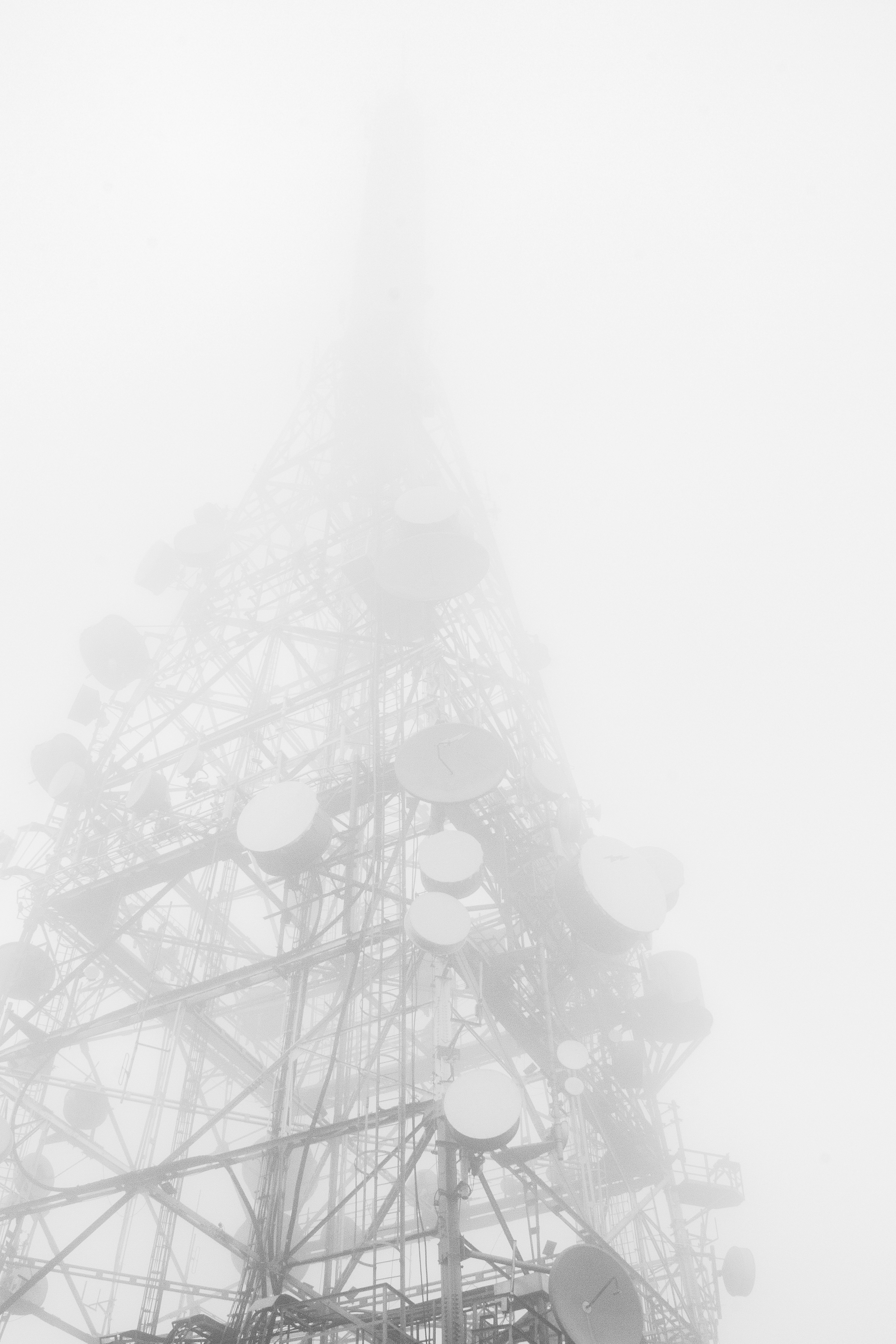 Gray telecommunications tower during foggy day photo – Free Brazil ...