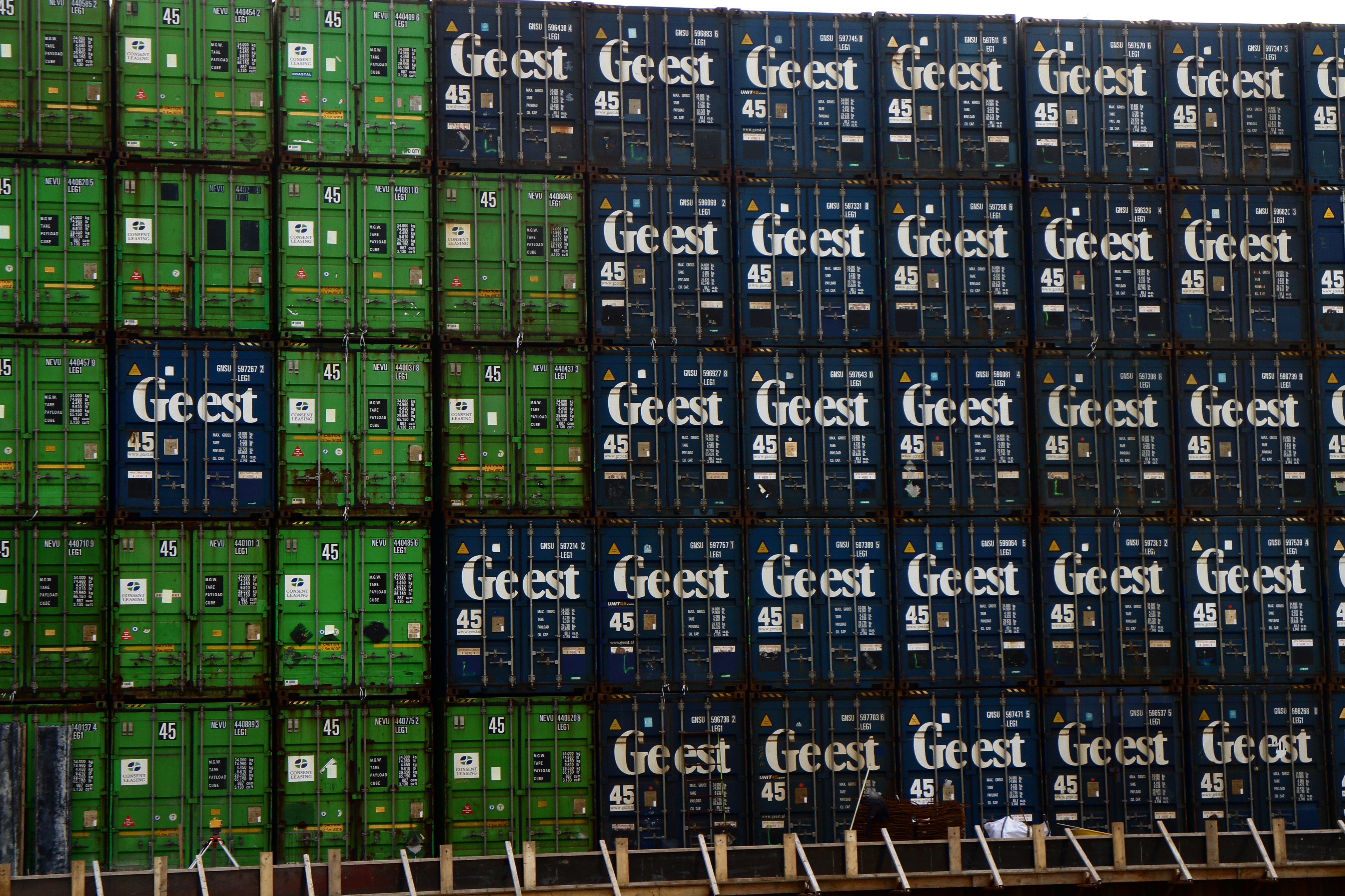 Pile of green-and-blue intermodal containers photo – Free Image on Unsplash