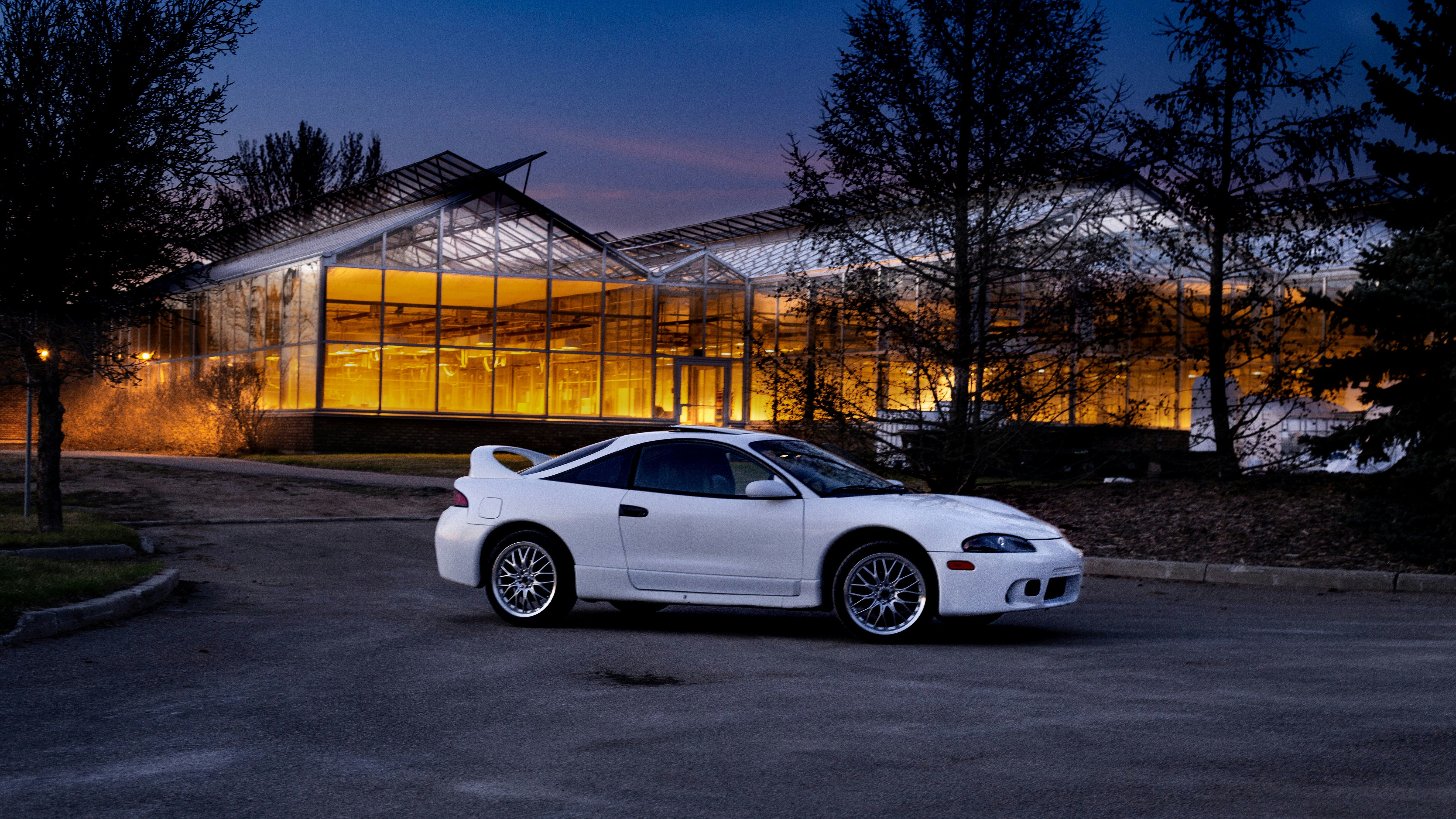 White Mitsubishi Eclipse parked near house photo – Free Car Image on ...