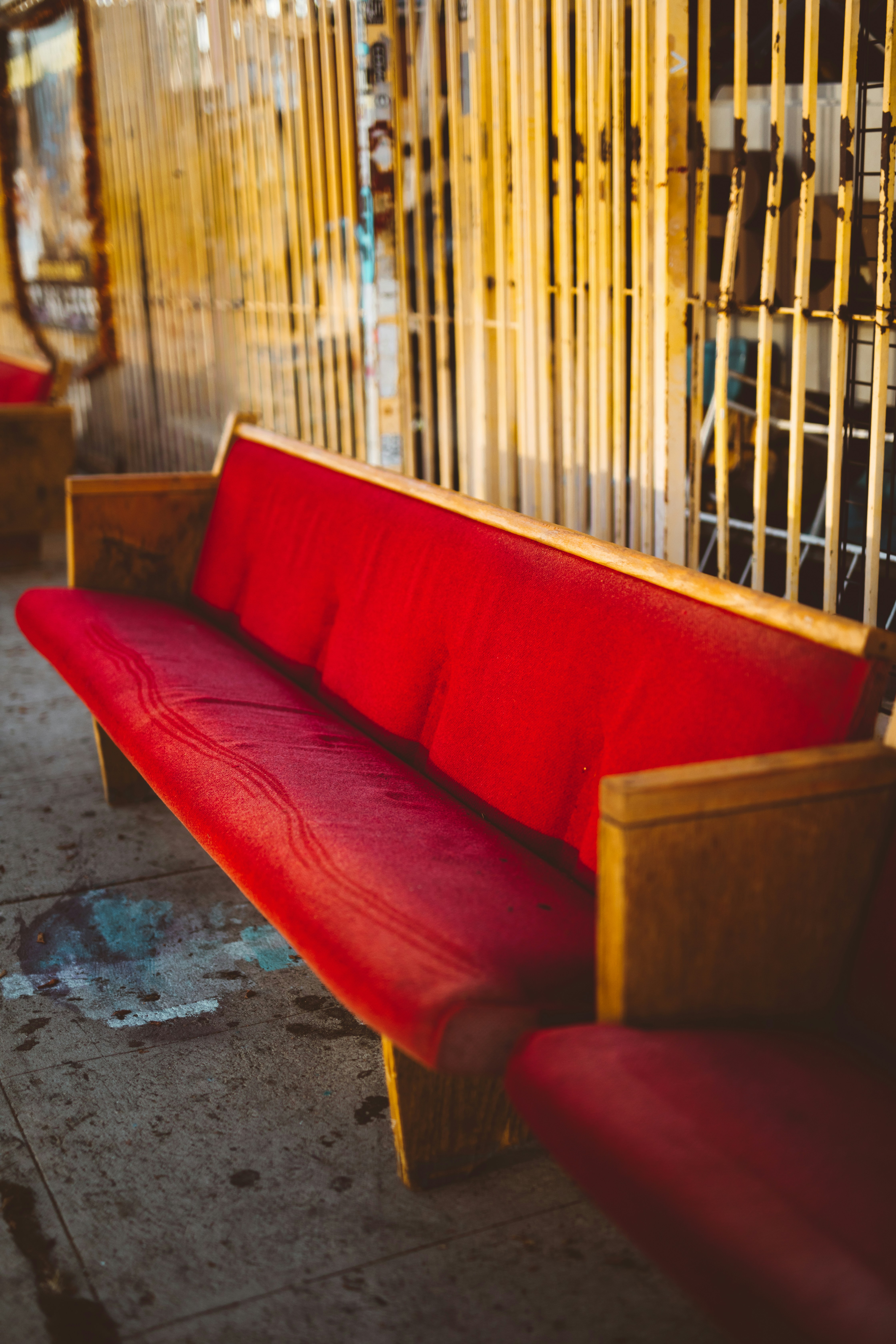 Red Velvet Bench in Neon-Loldened Interior