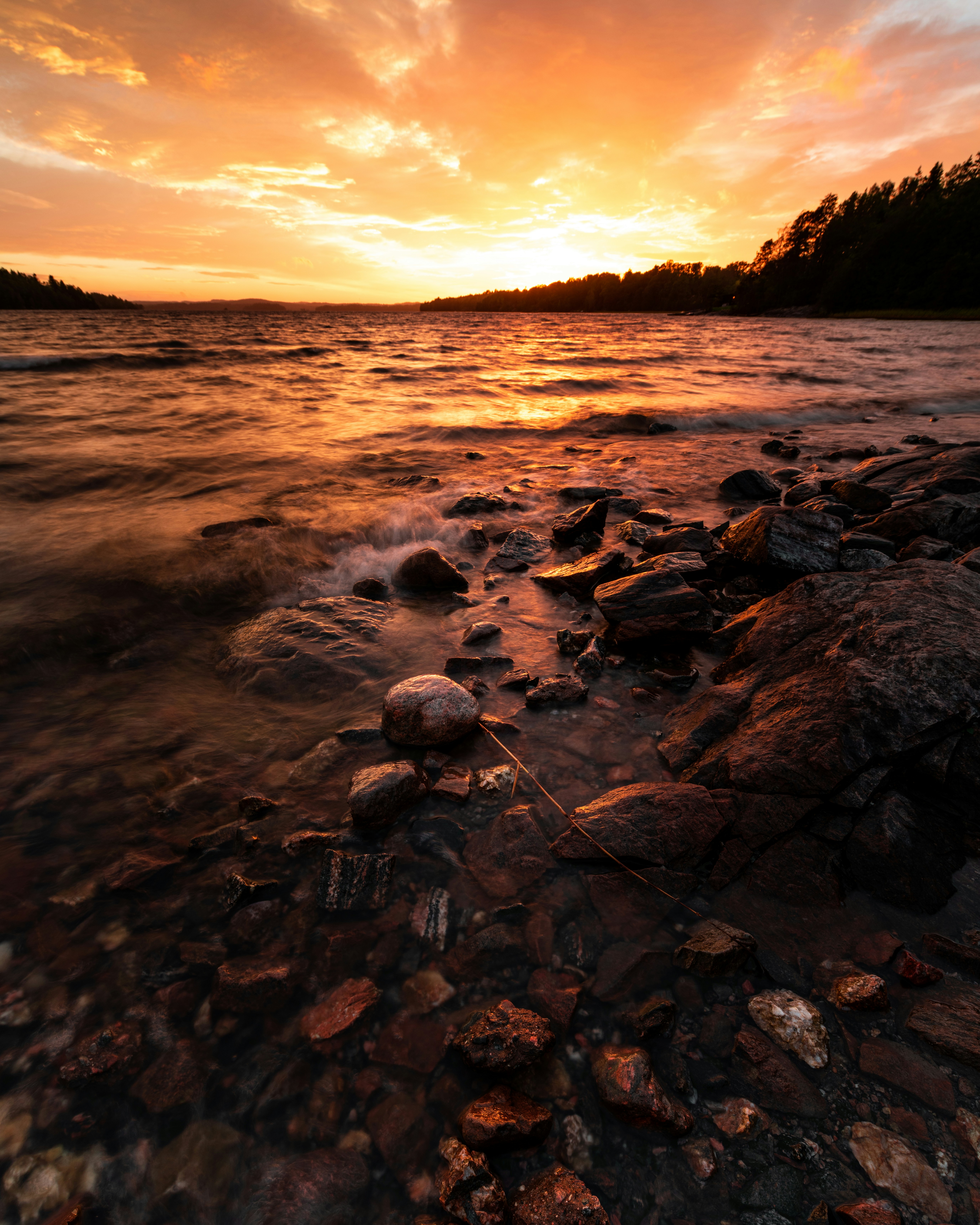 Ember Horizon over a Rugged Seaside