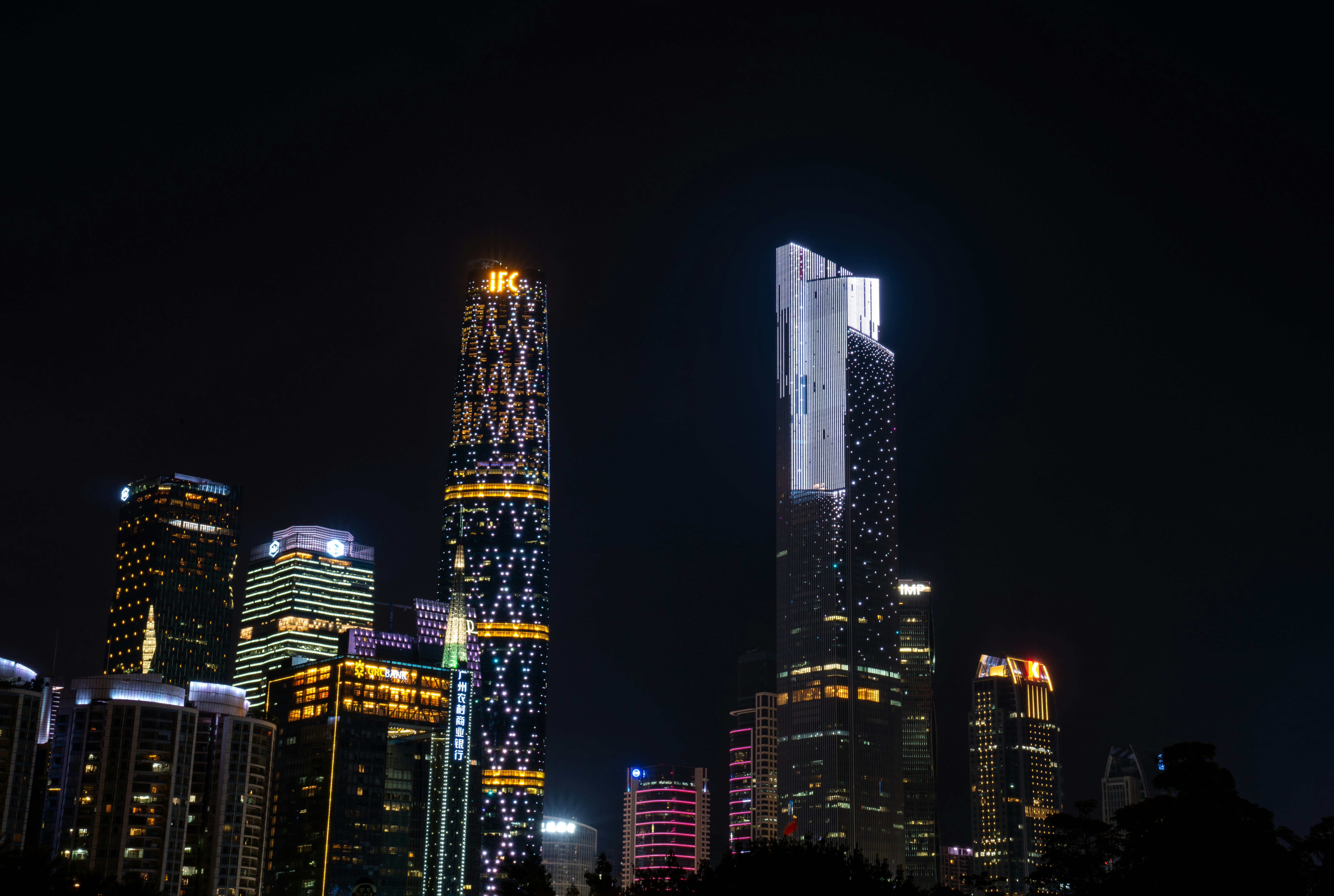 City with high-rise buildings during night time photo – Free Grey Image ...
