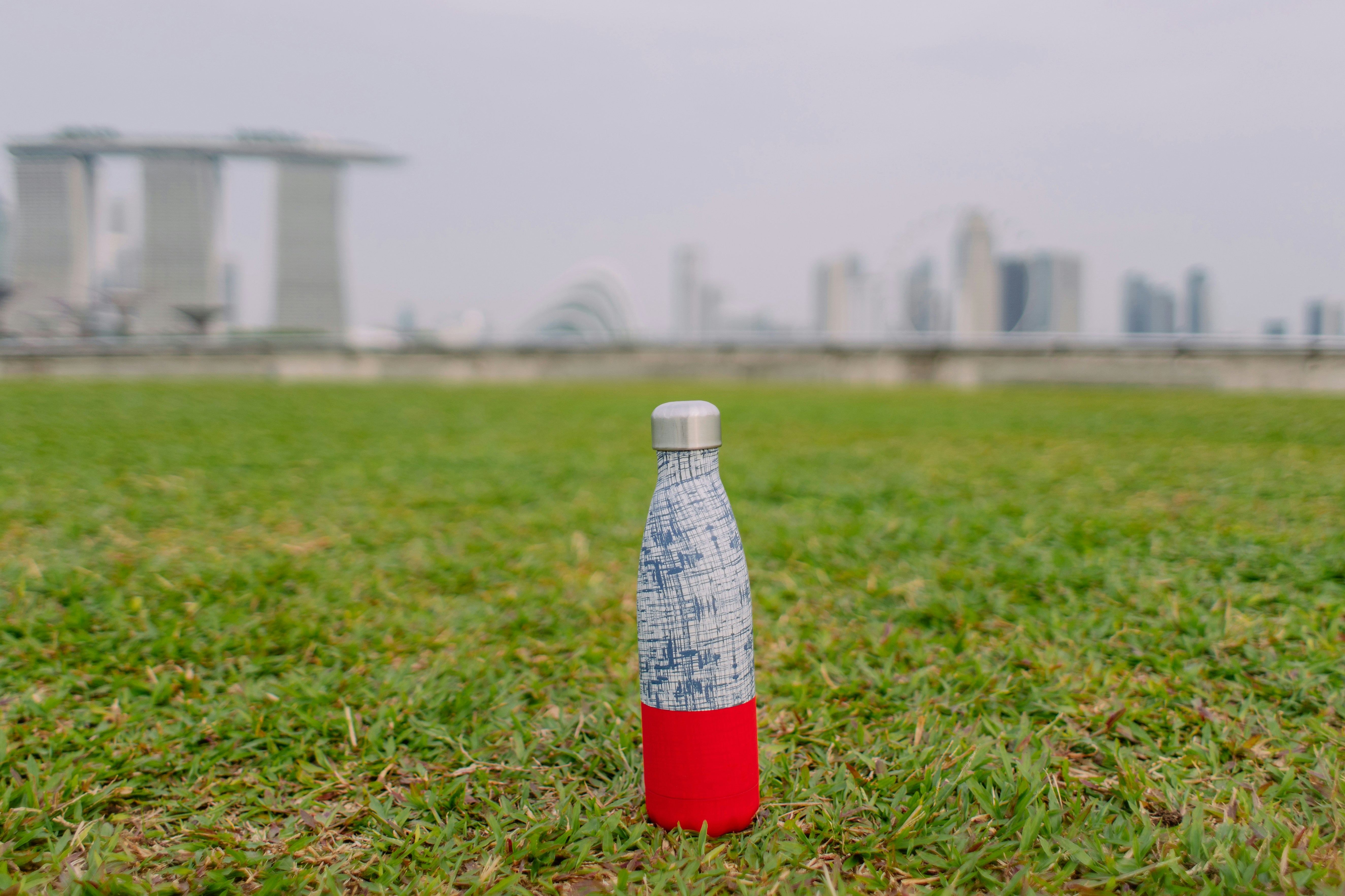 Gray and red bottle photo – Free Singapore Image on Unsplash