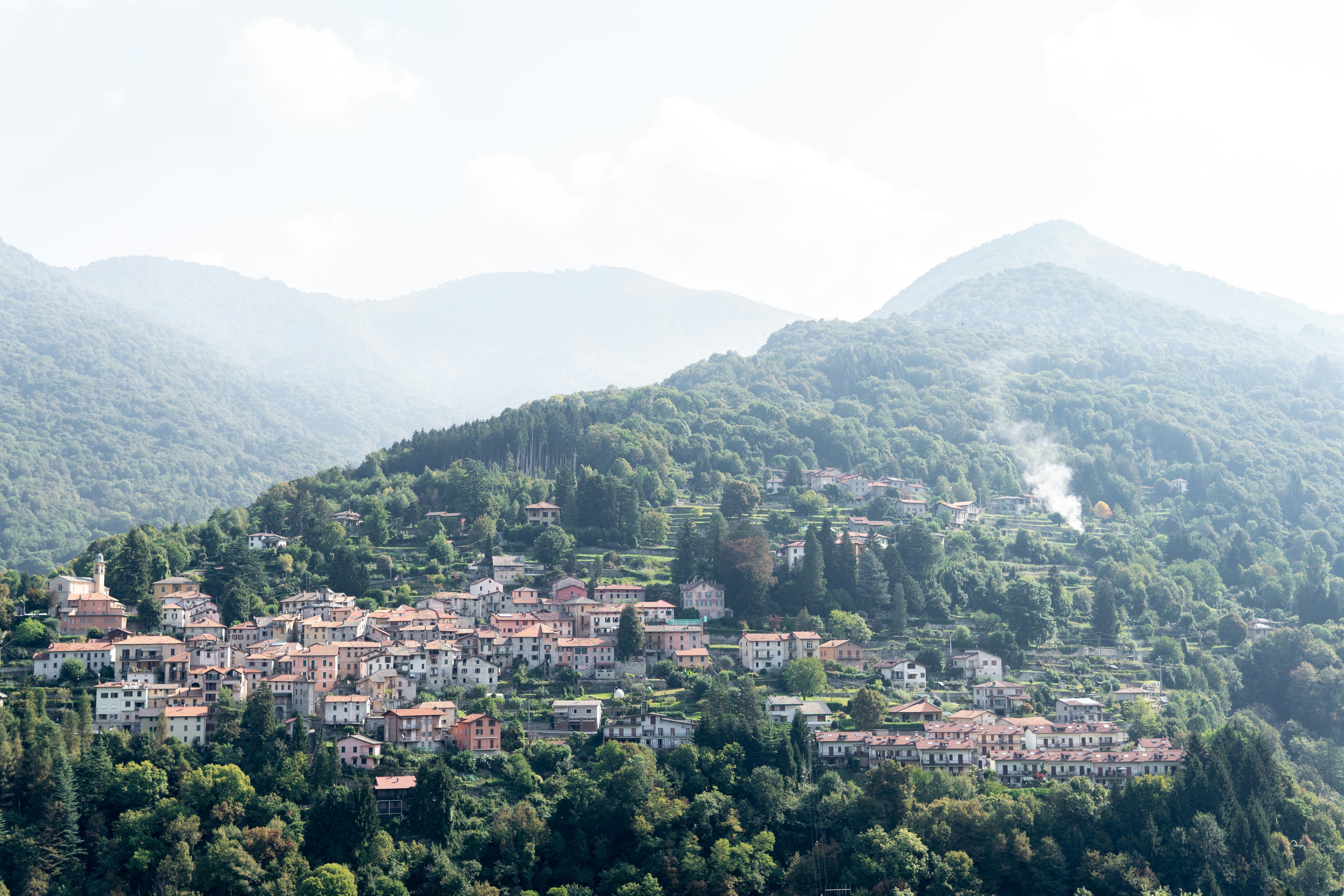 Aerial photo of buildings on mountains at daytime photo – Free Italy ...