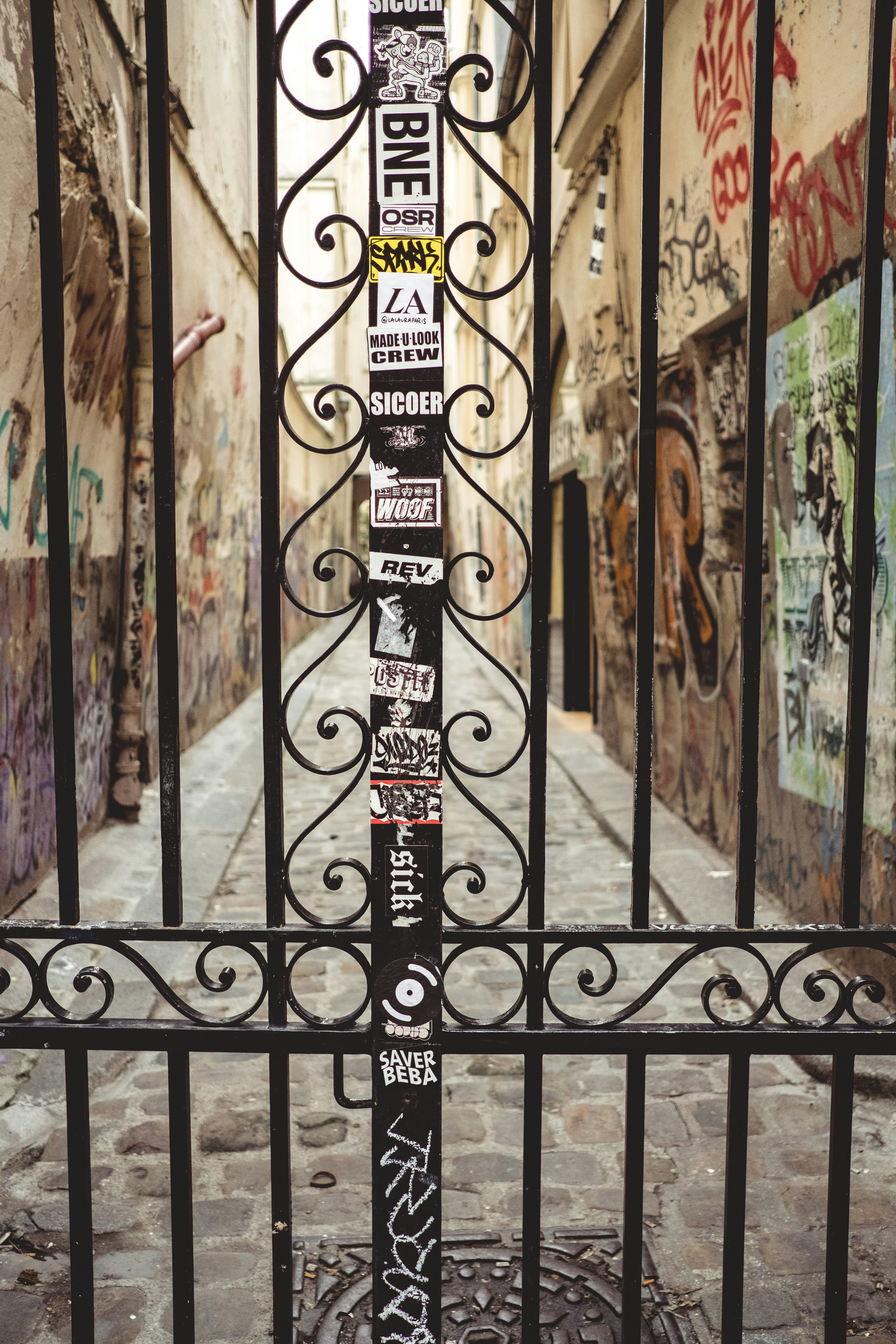 Graftiti filled wall on alley photo – Free Gate Image on Unsplash