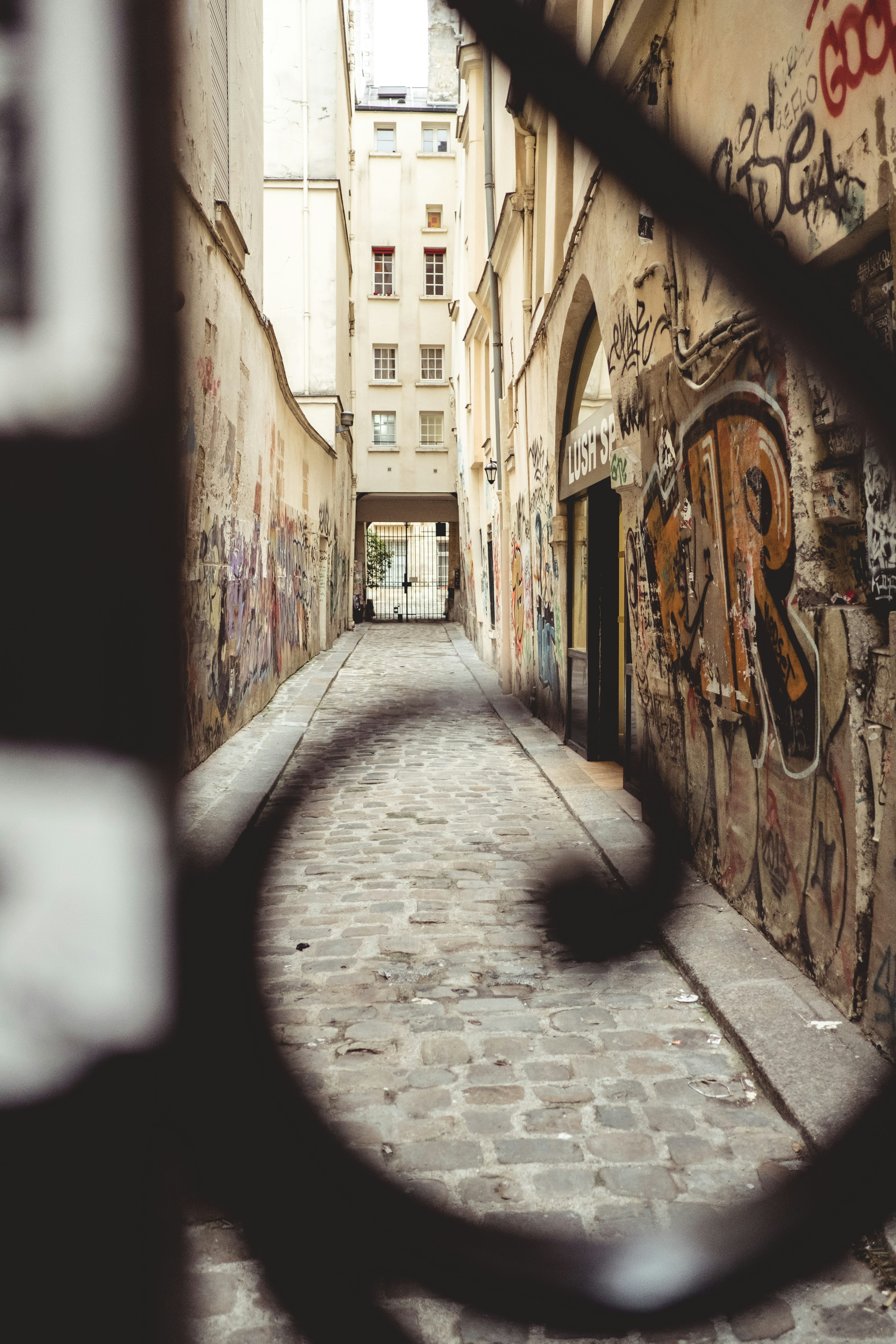 Empty concrete hallway alley between buildings photo – Free City Image ...