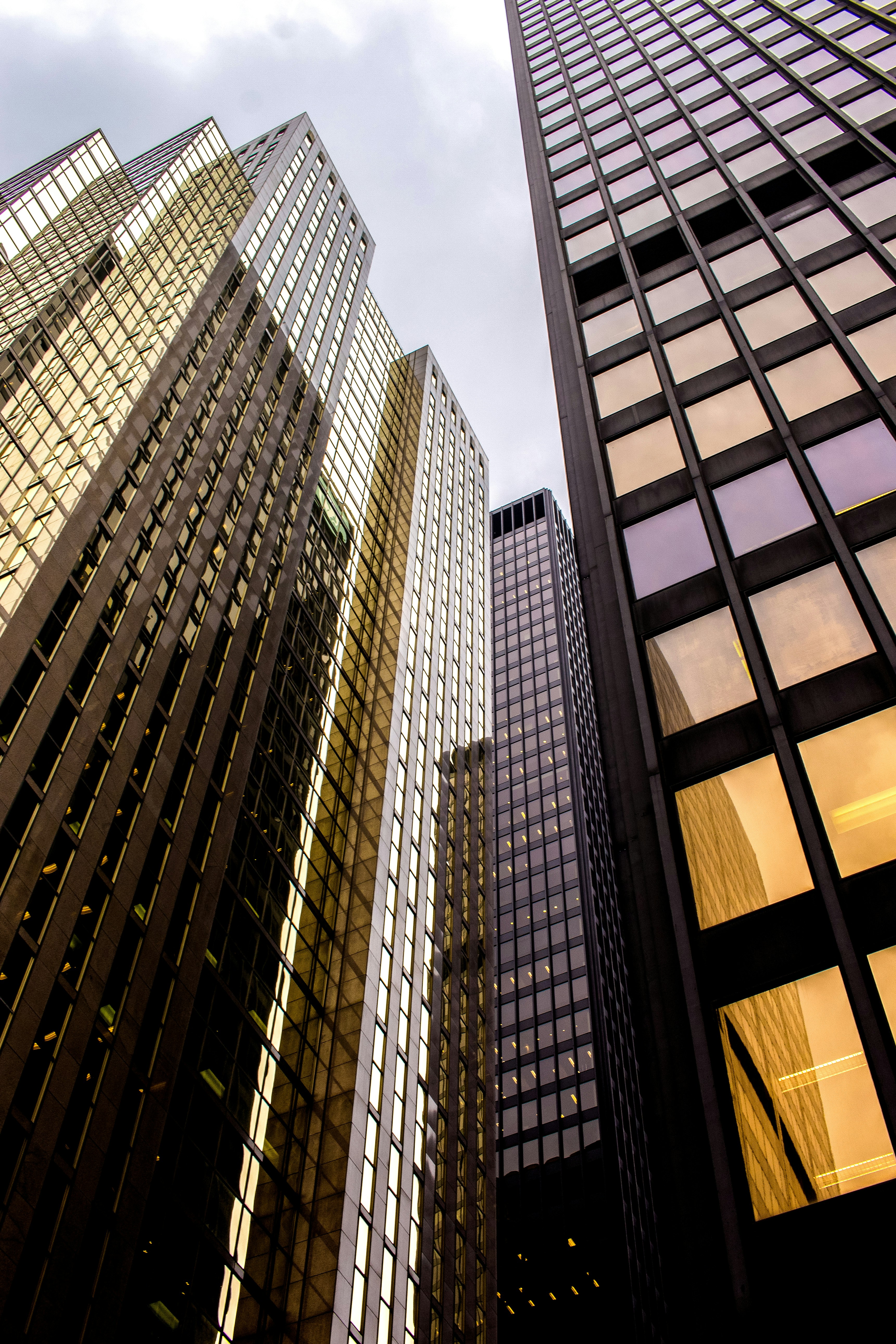 Low angle photography of high rise buildings during daytime photo ...