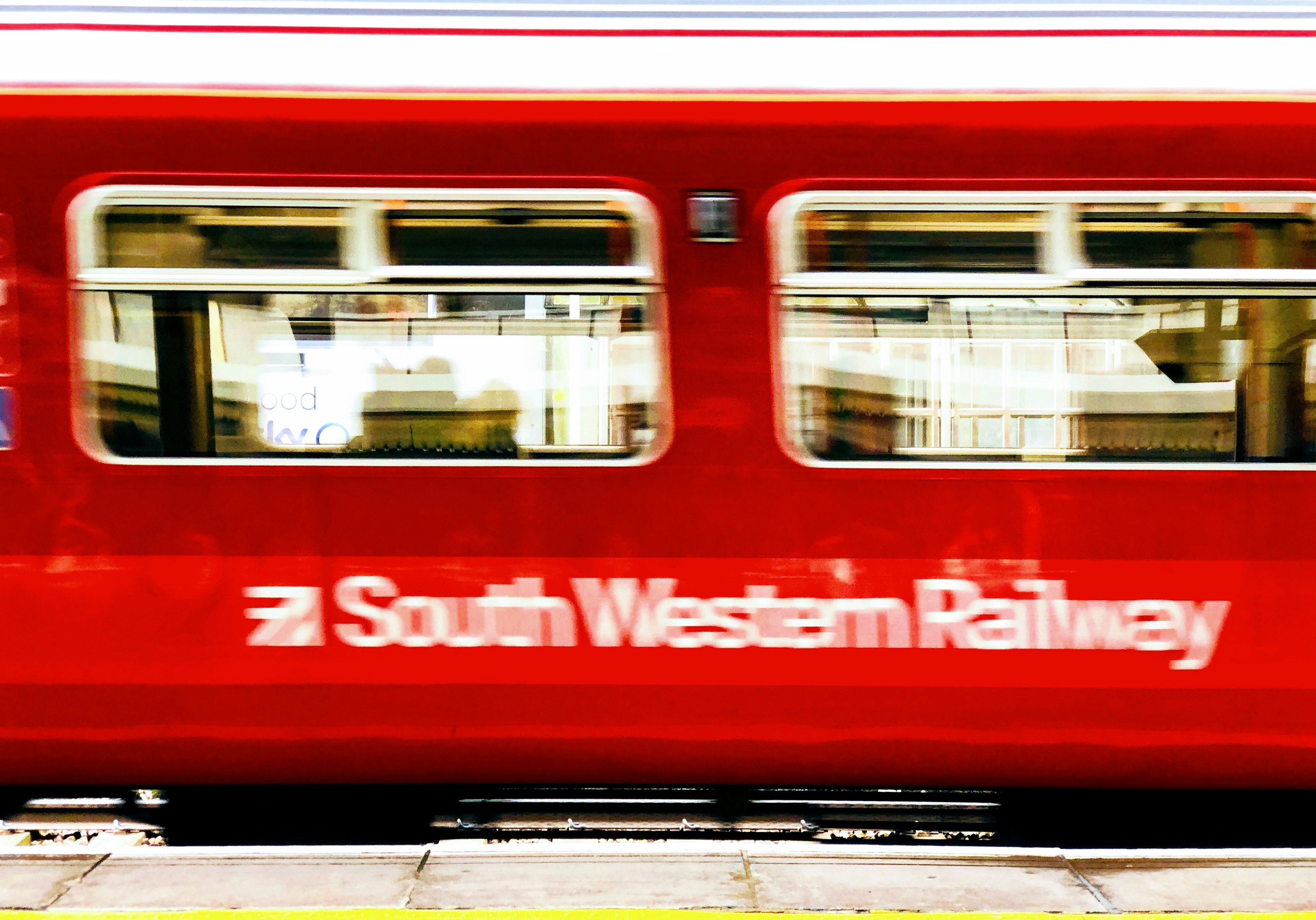 Red South Western Railway train photo – Free Putney Image on Unsplash