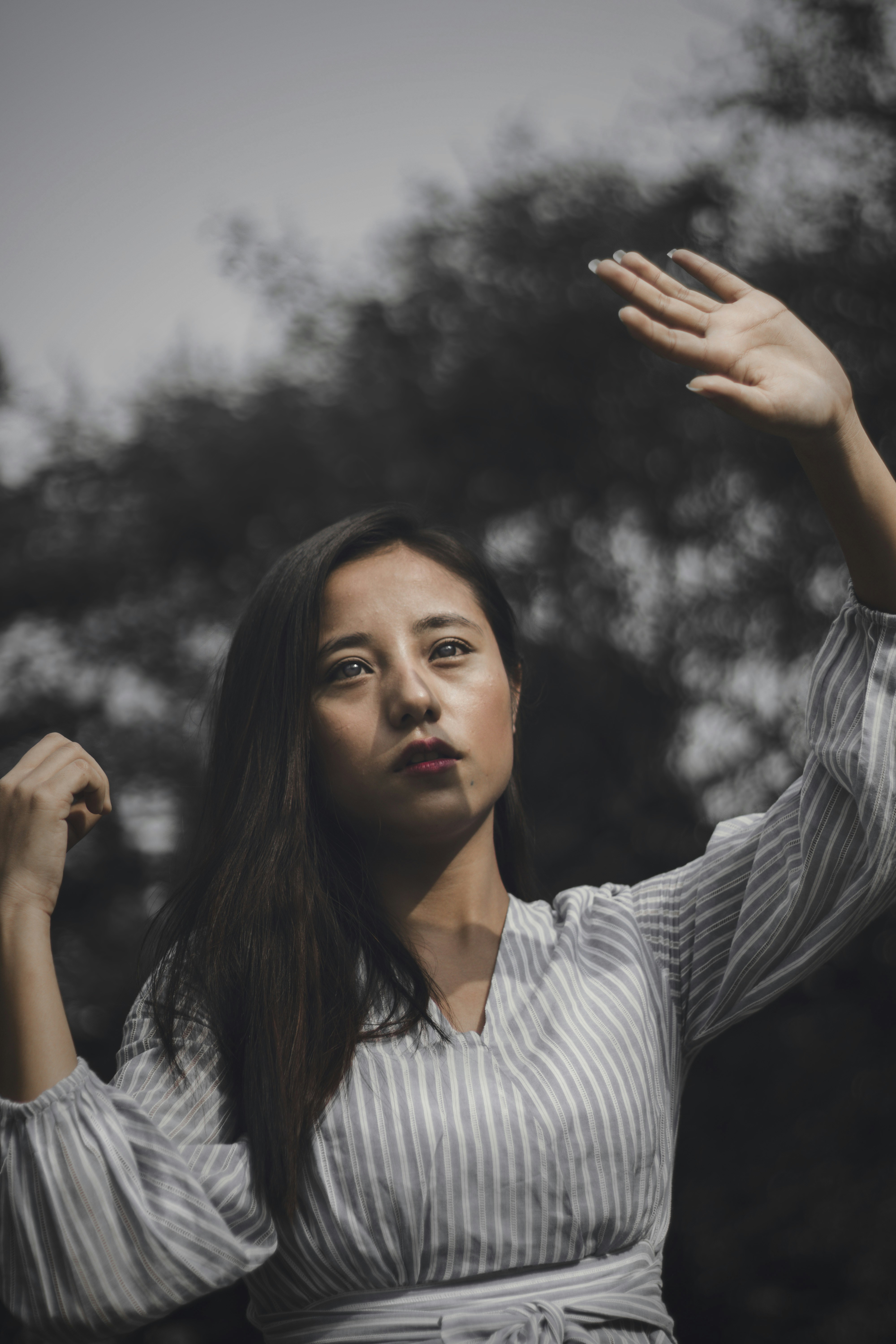 Woman raising right hand photo – Free India Image on Unsplash