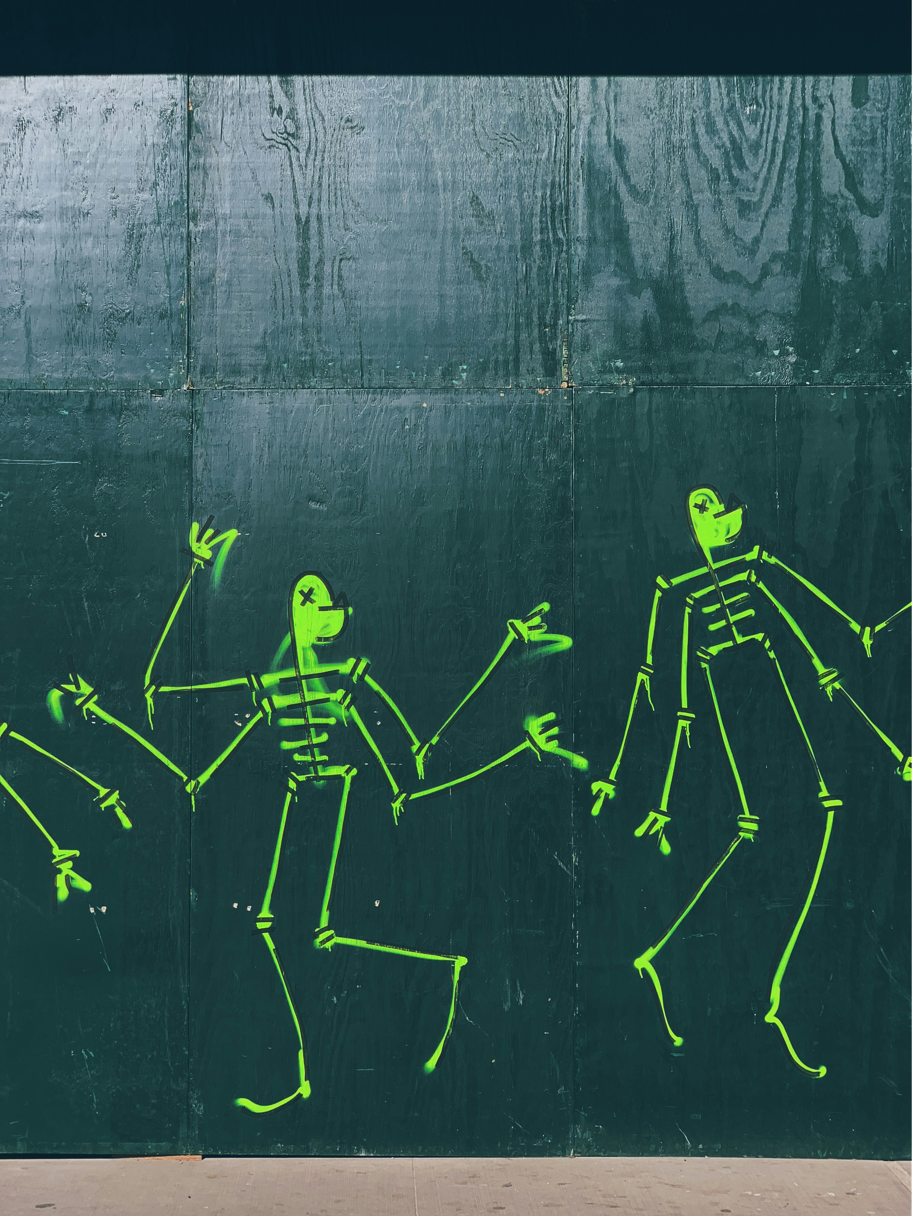 Green skeletons painted on wall photo – Free Grey Image on Unsplash