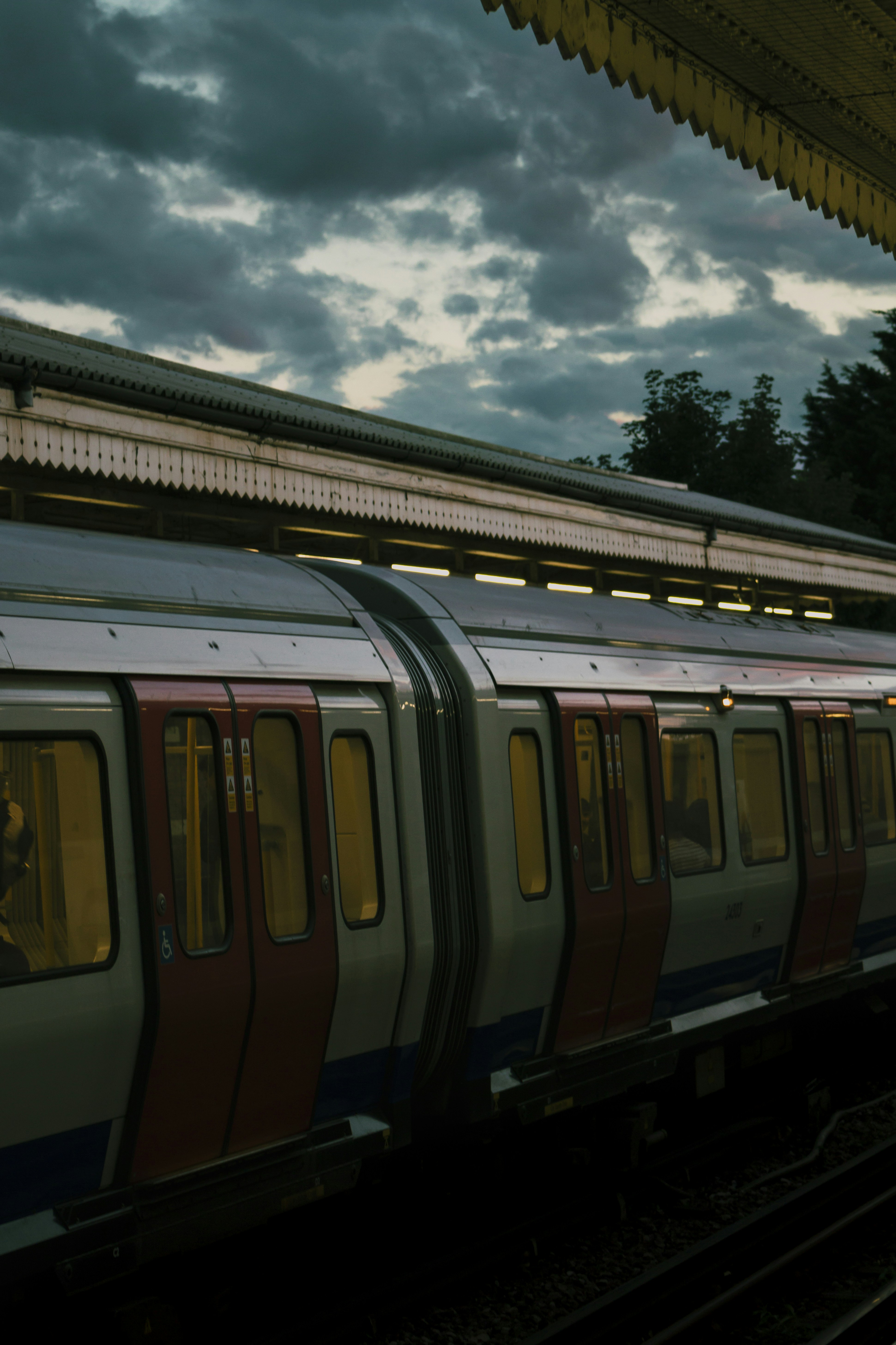 Gray and red train photo – Free London Image on Unsplash