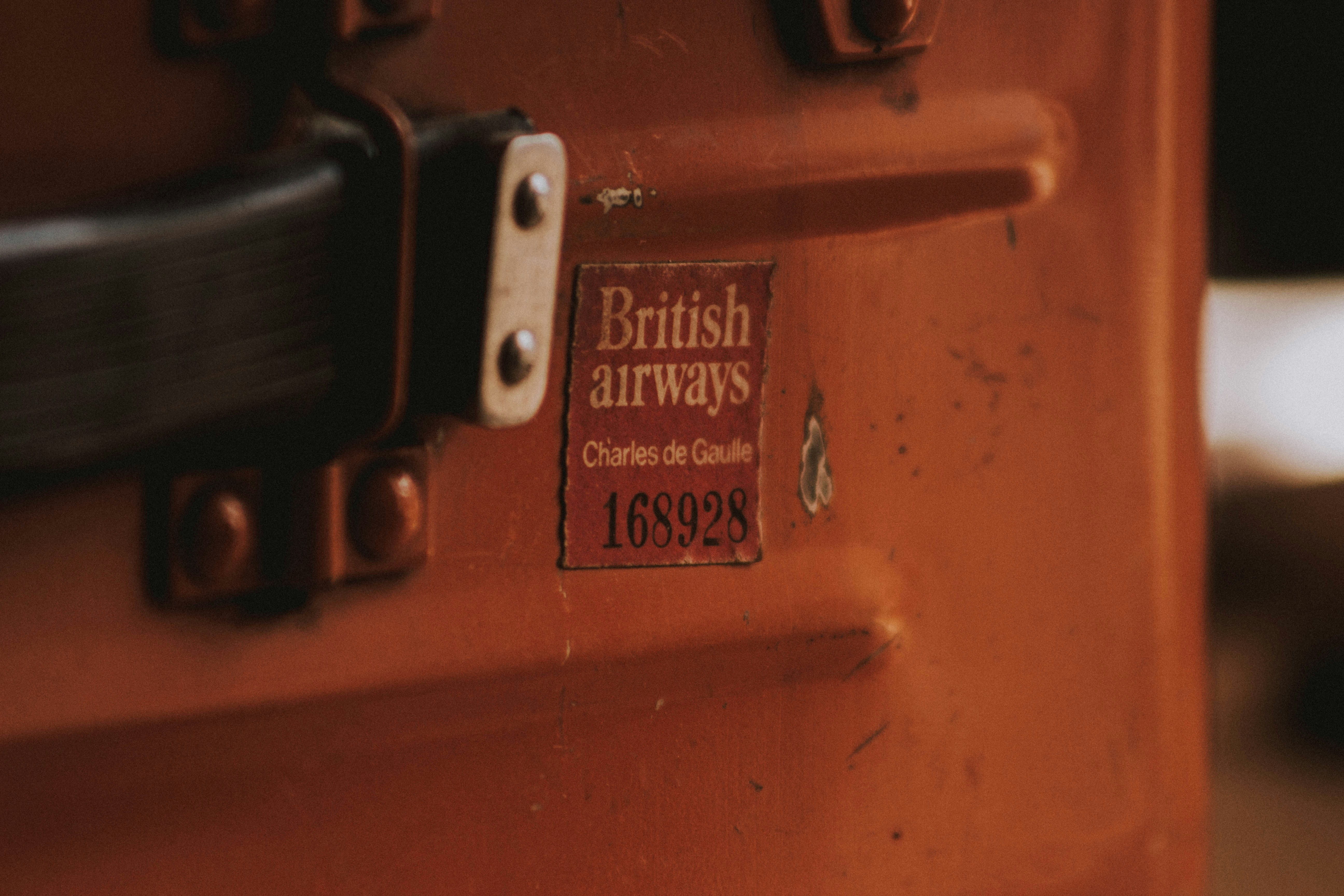 Stamp on the Rust: A Vintage British Airways Luggage Tag in Warm Light