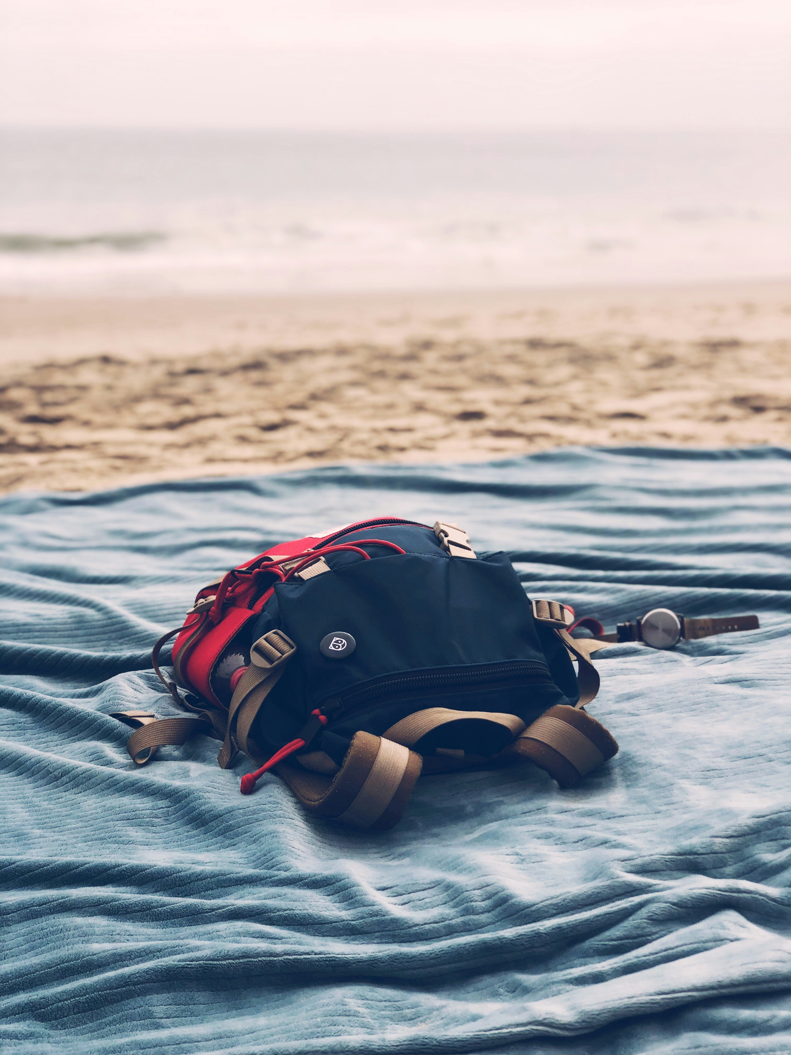 Equipment on a sunlit beach, awaiting the next adventure