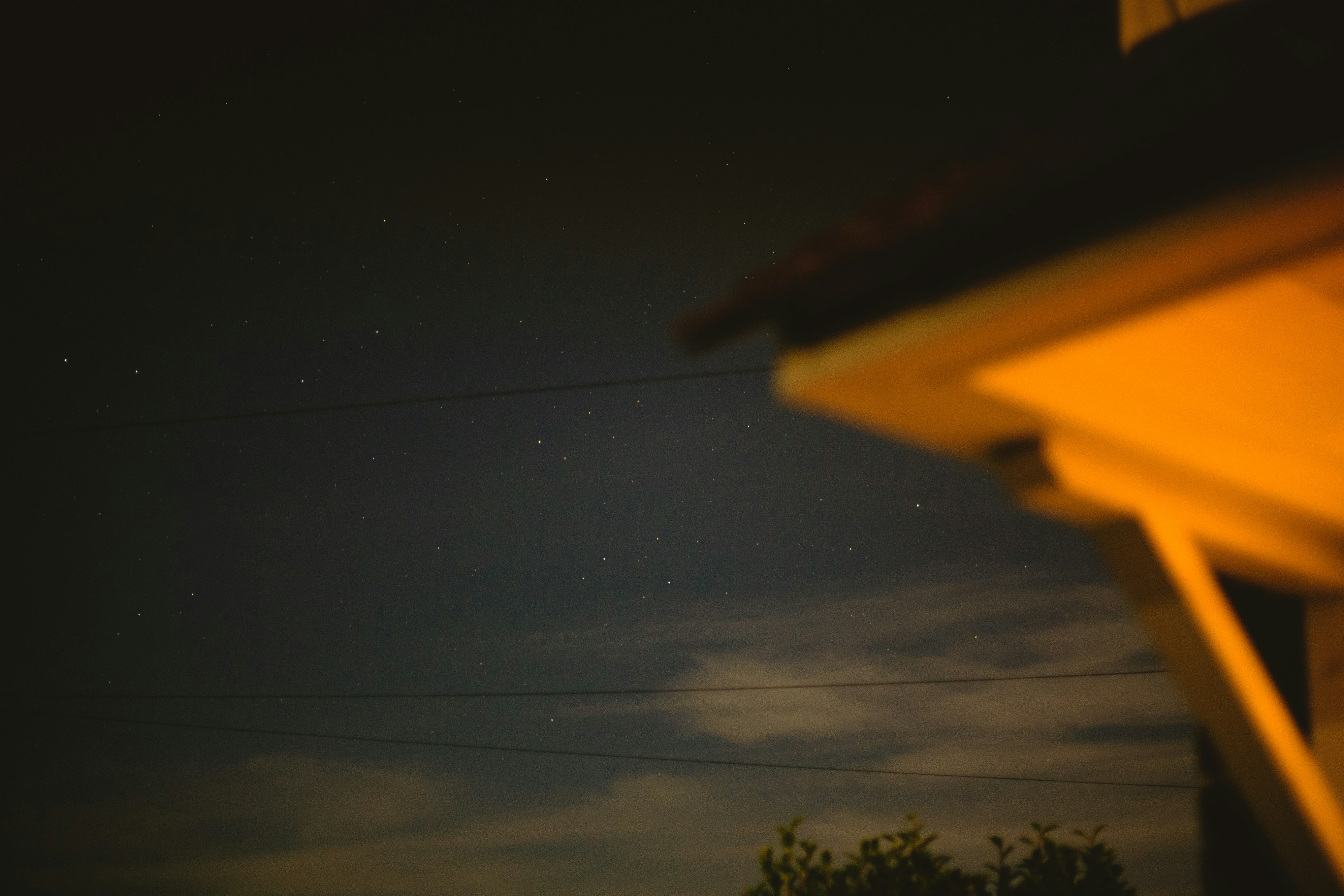 A night sky with a few stars in the distance photo – Free New forest ...