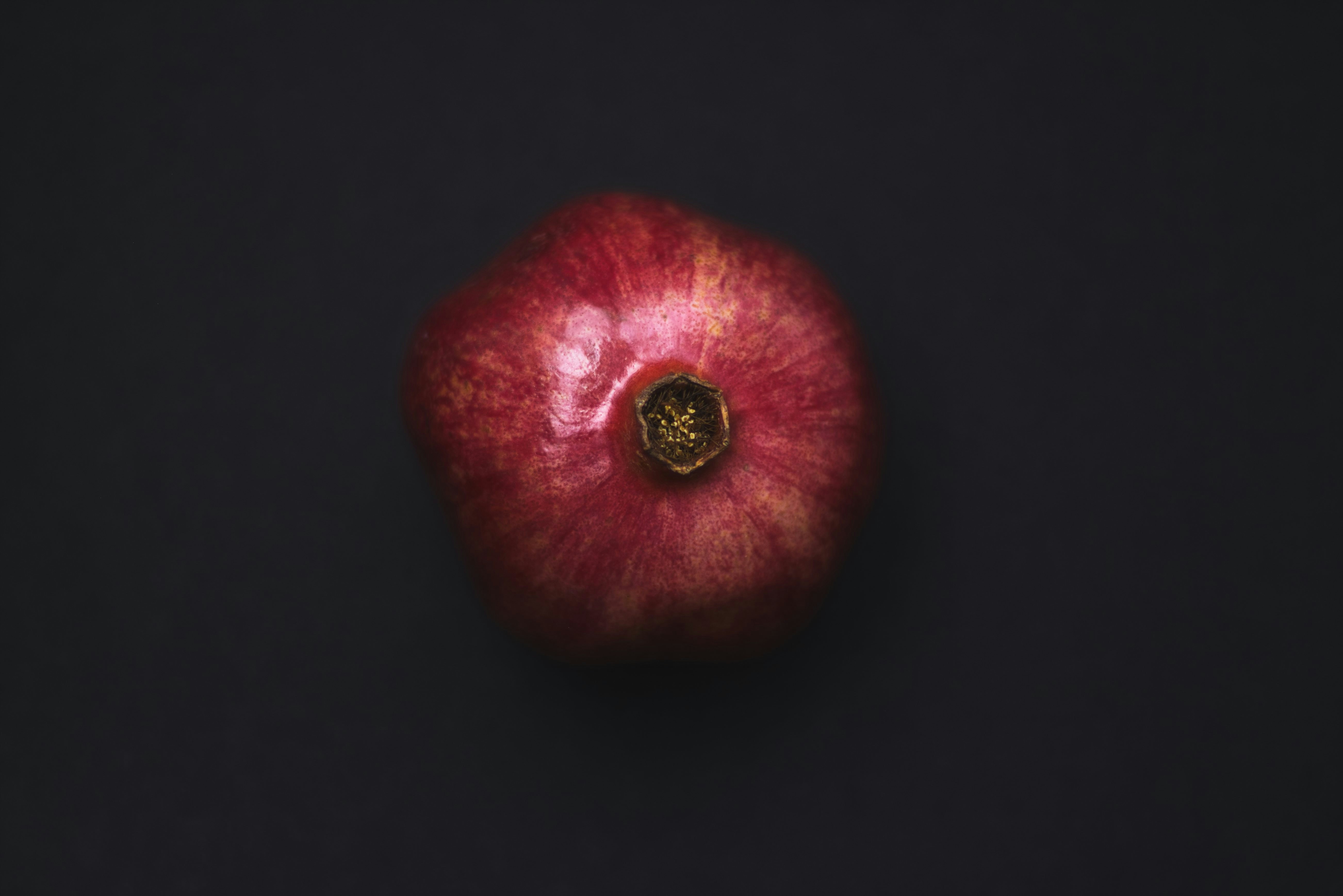 A close up of an apple on a black background photo – Free Food Image on ...