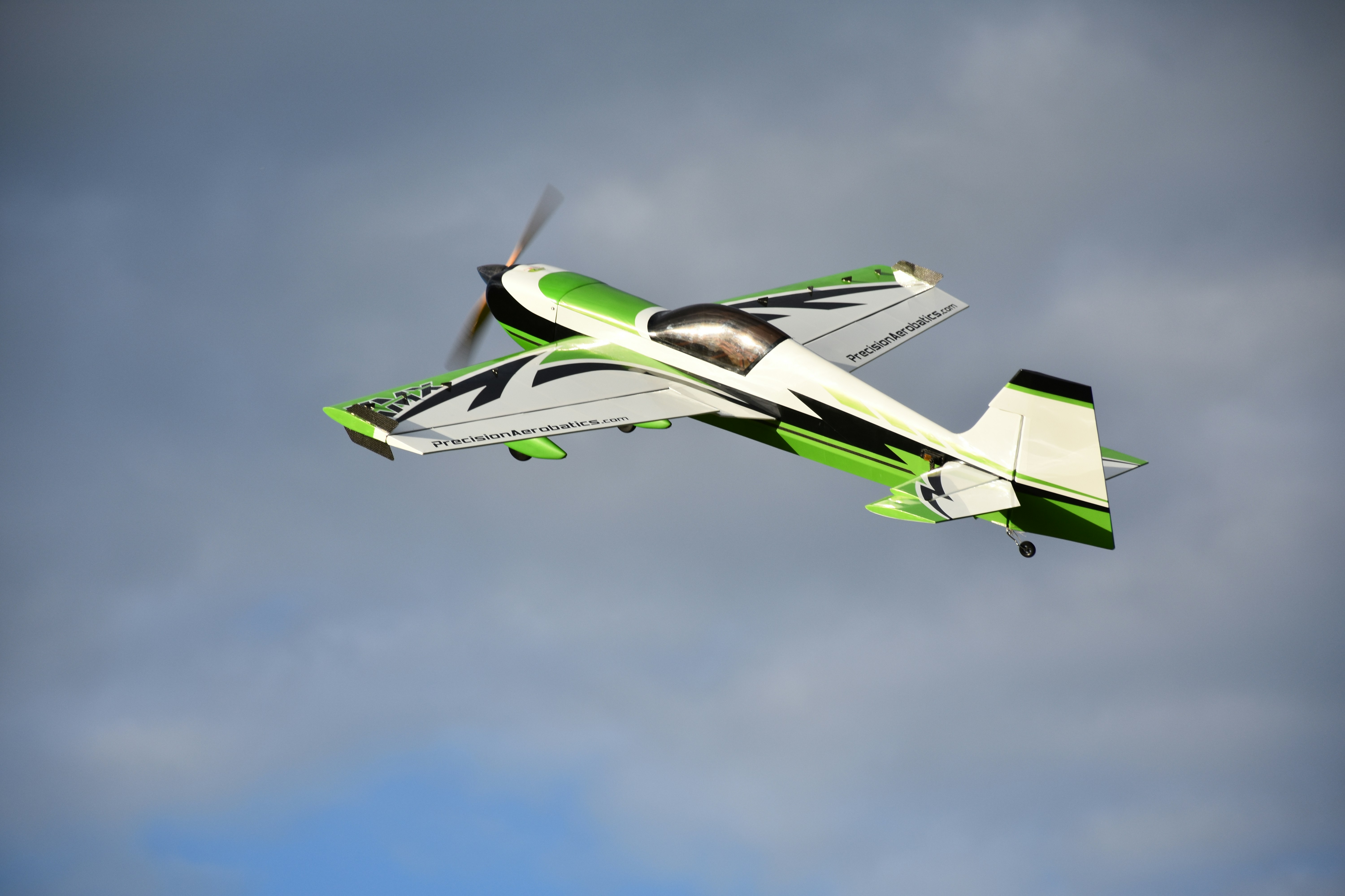 White and green biplane photo – Free Flugshow Image on Unsplash