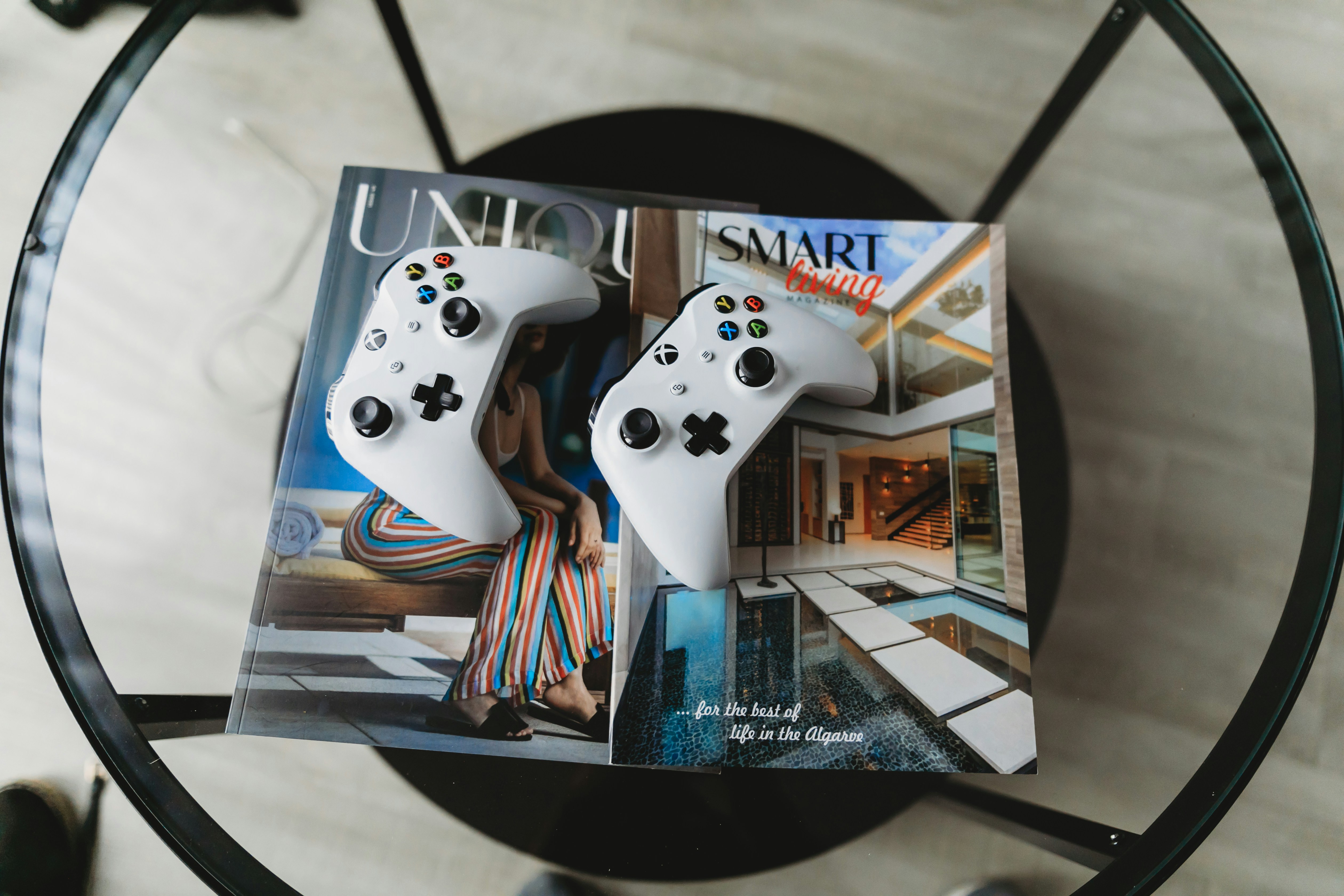 Two Xbox One controllers on magazine photo – Free Electronics Image on ...