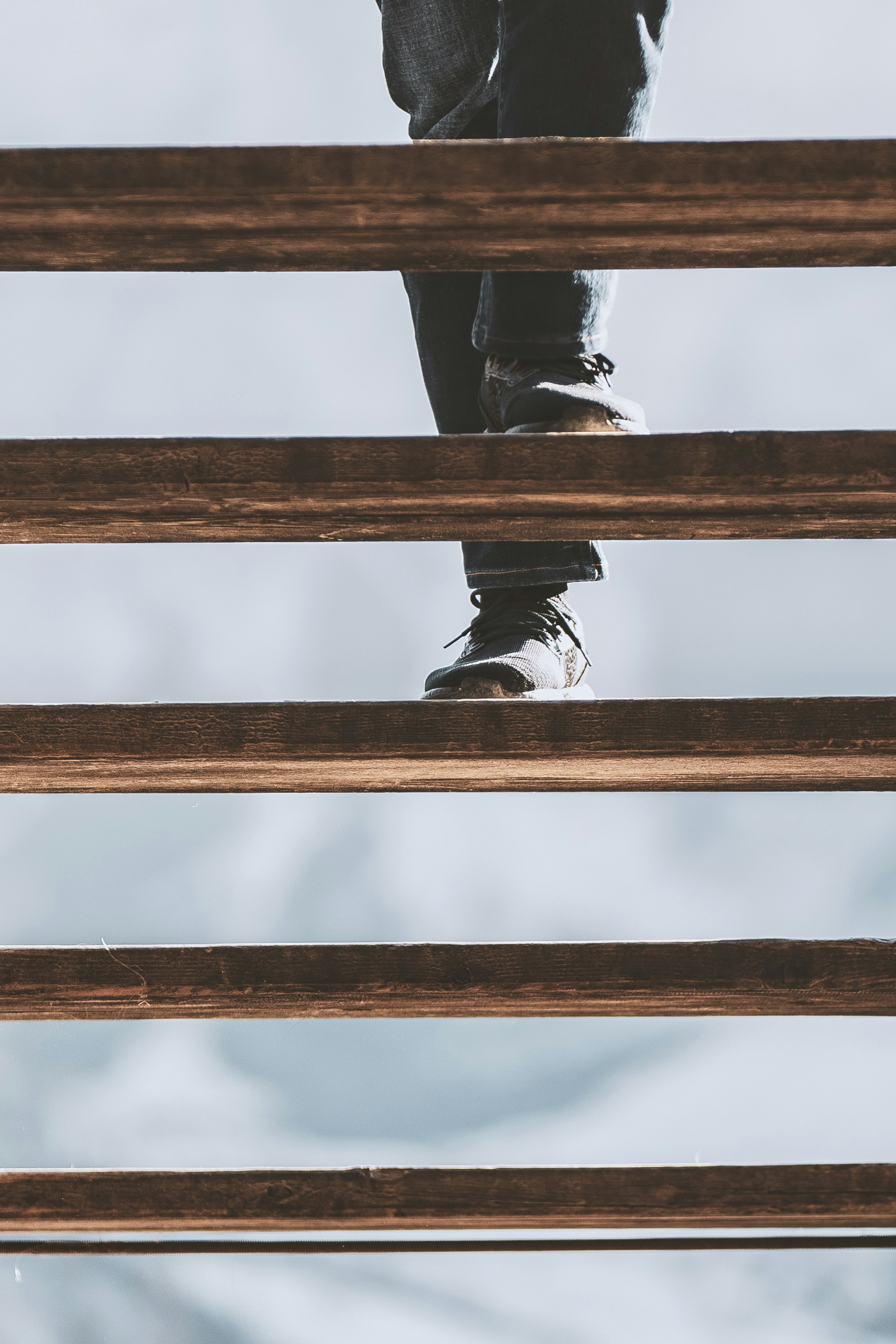 Person stepping on wooden stair photo – Free Grey Image on Unsplash