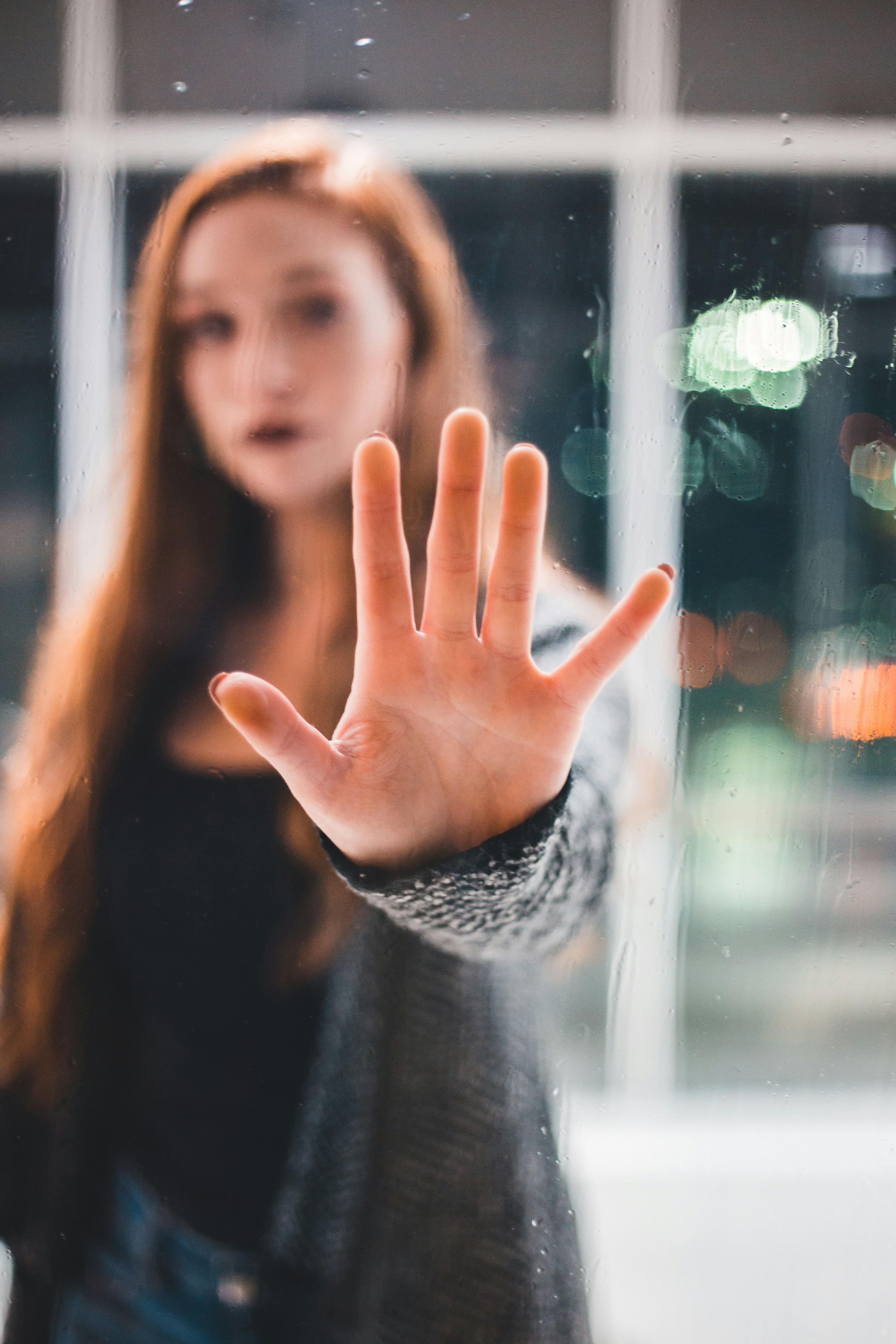 Bokeh photography of woman touching glass wall photo – Free Canada ...
