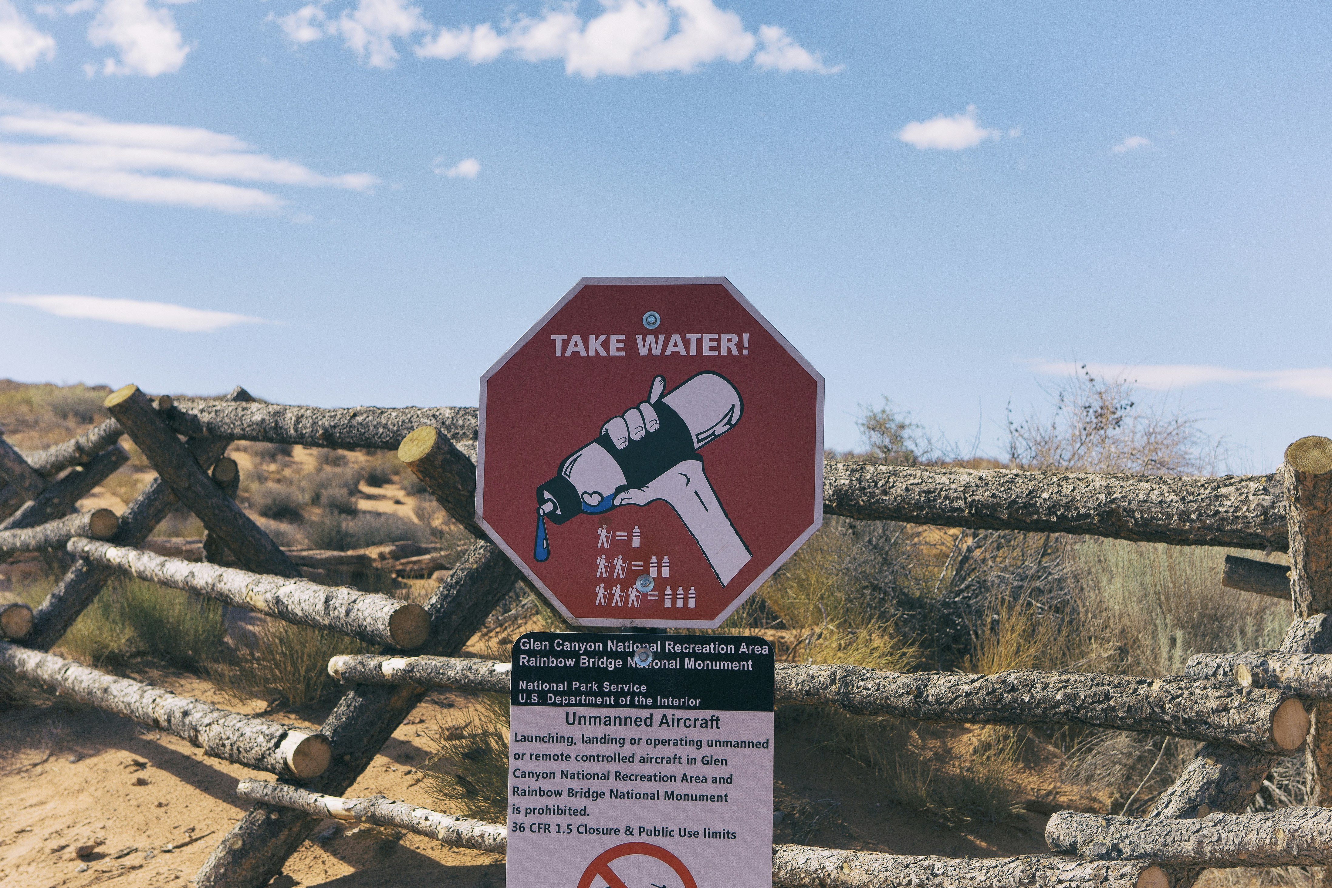 Take water signage on brown fence photo – Free Sign Image on Unsplash