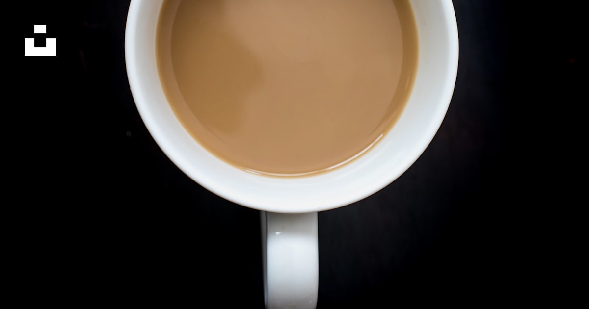 Liquide Brun Dans Une Tasse En Céramique Blanche Photo Image Gratuite