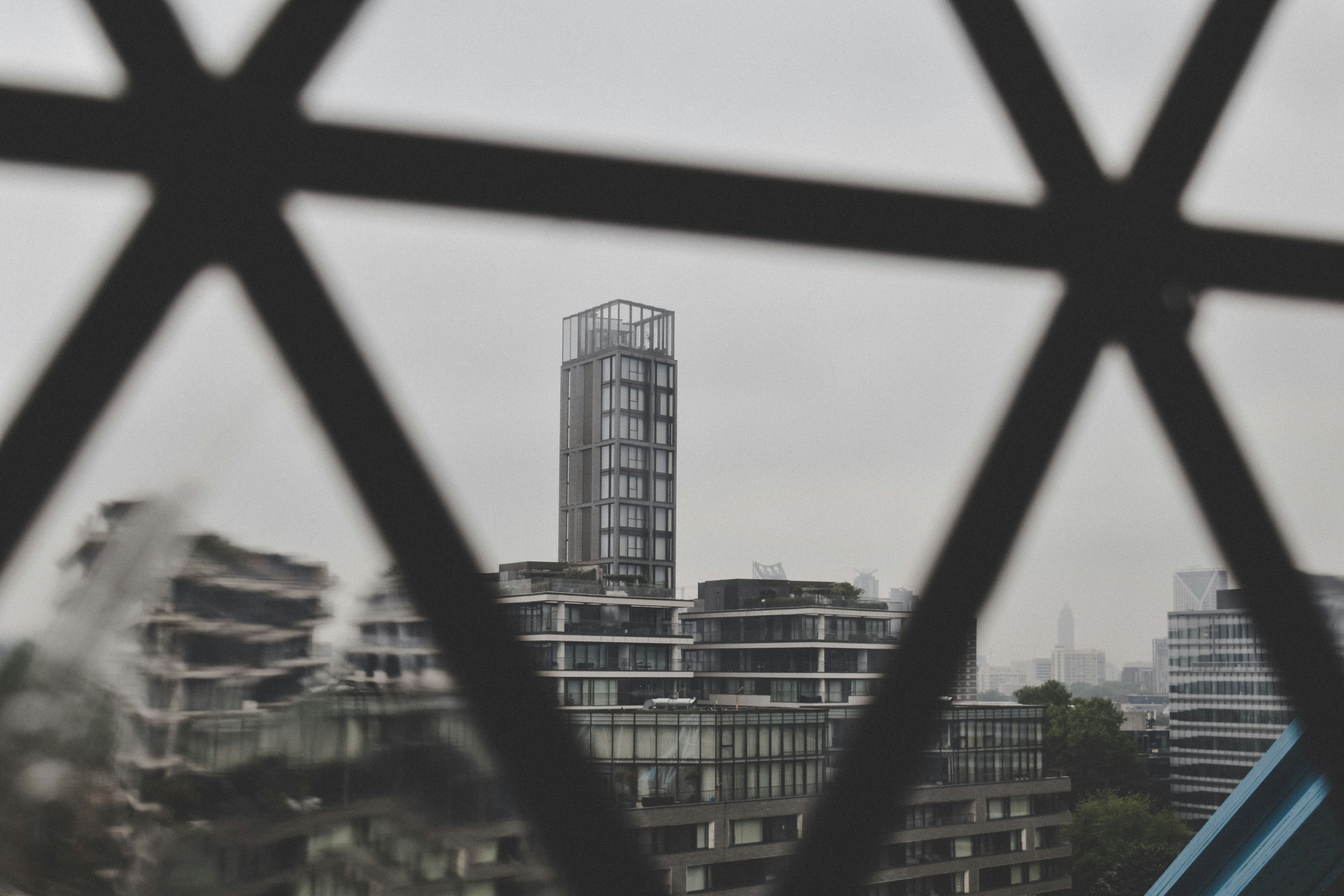 Urban Lattice: A Tower Pierces Through a Geometric Veil