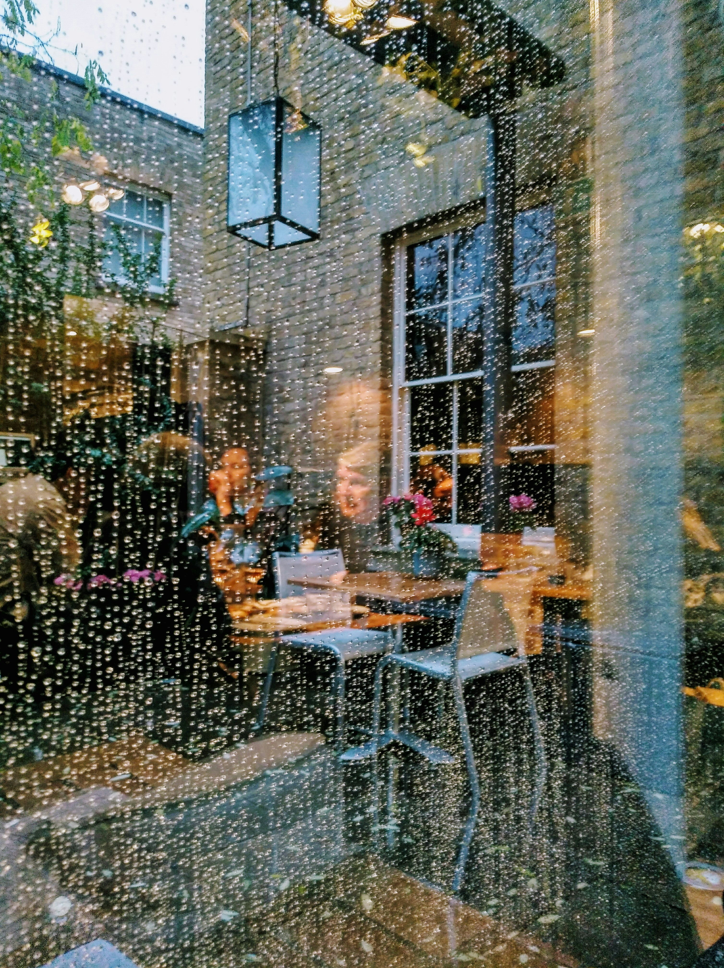 Rain-Kissed Café ReflectionsJB