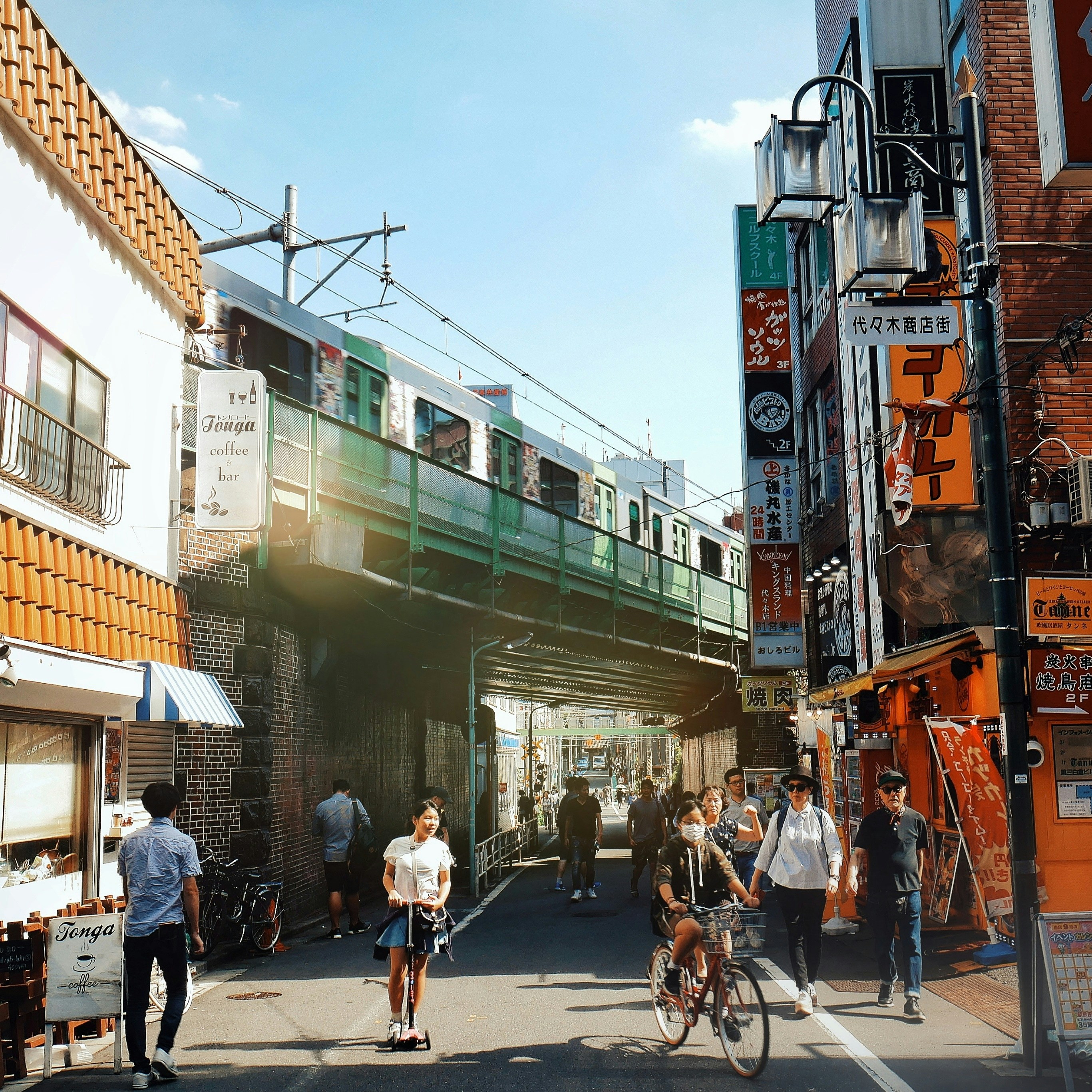 People walking between buildings photo – Free Shibuya Image on Unsplash