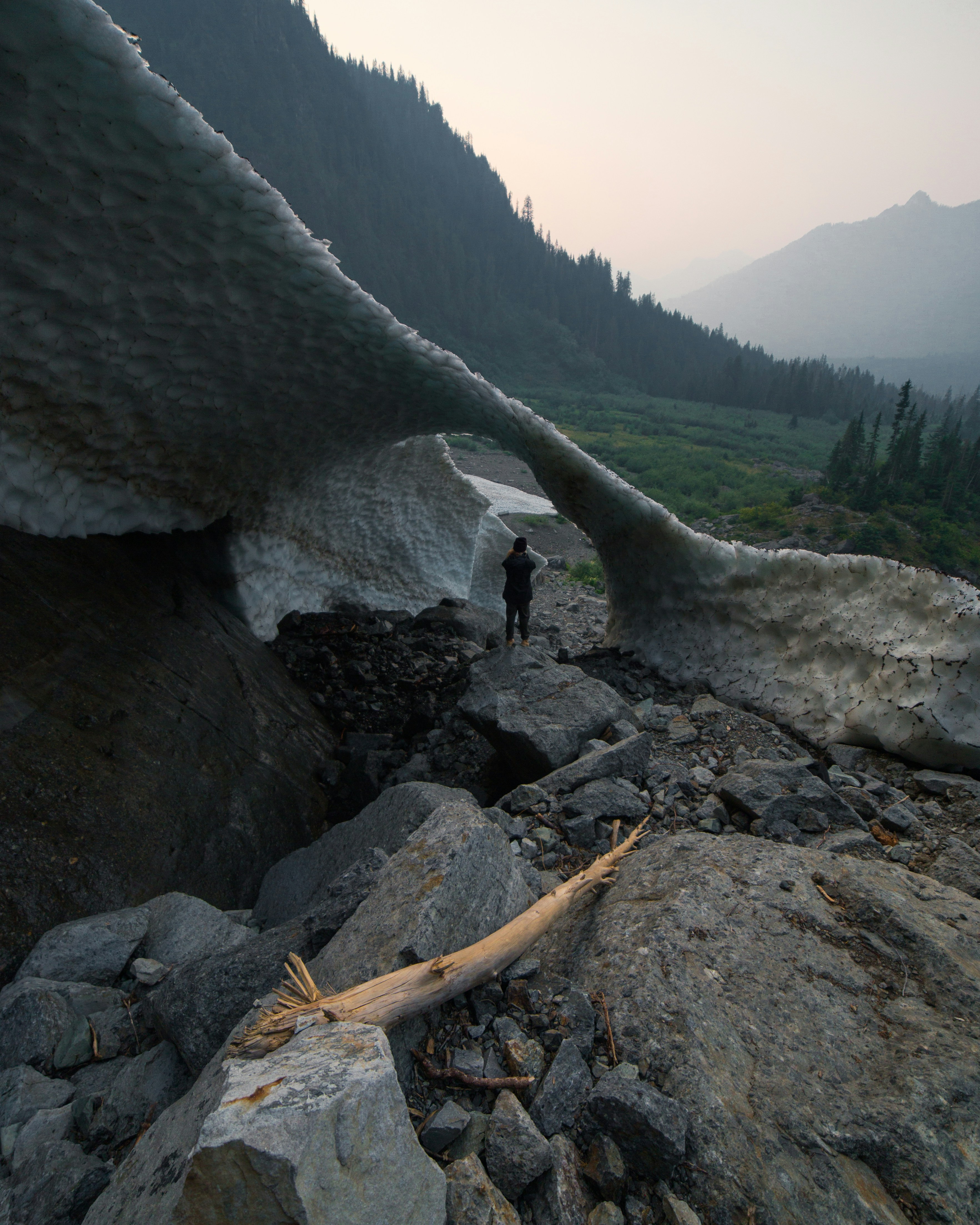 Person standing on rock formation photo – Free Human Image on Unsplash