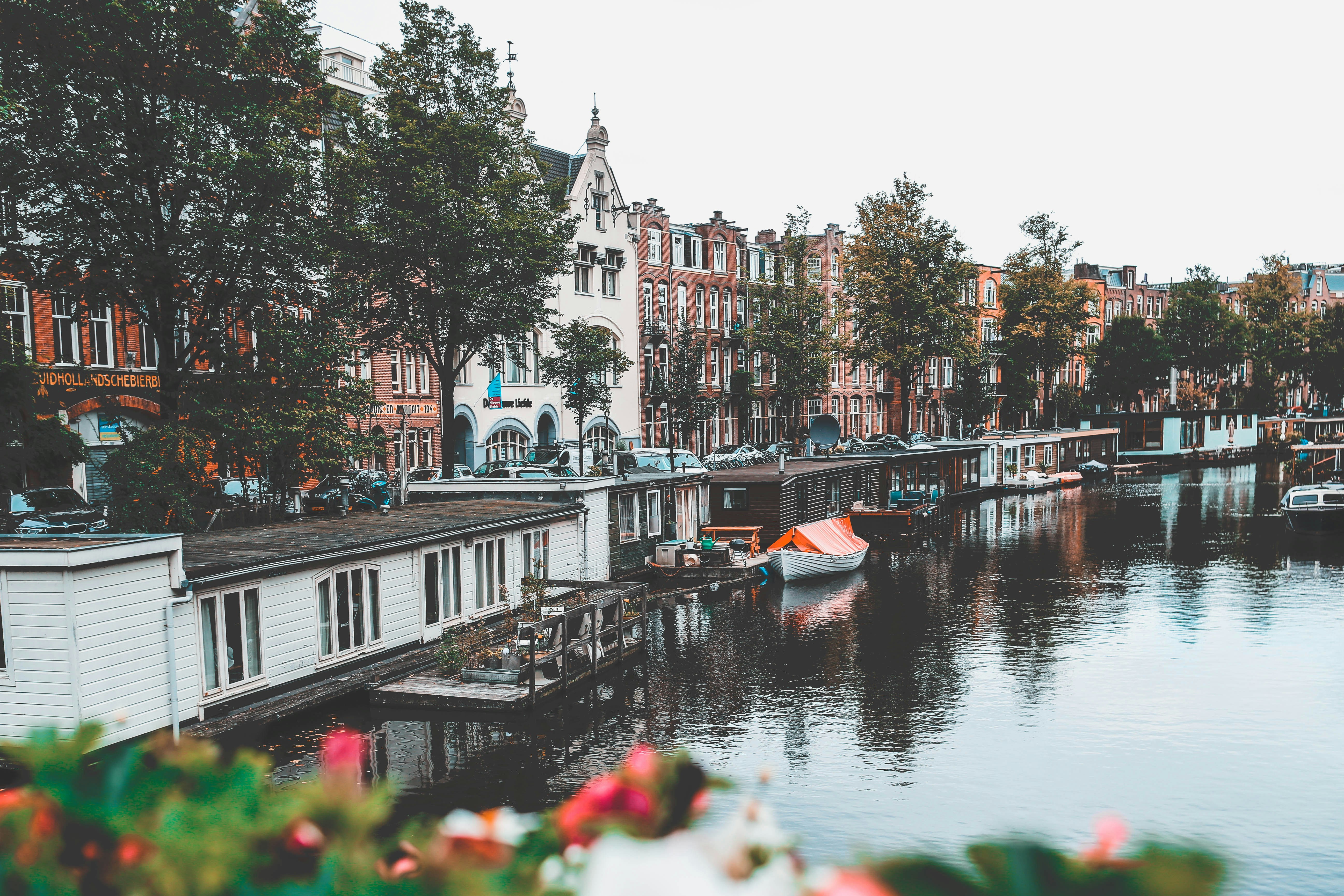 View of a riverside in a city photo – Free Canal Image on Unsplash
