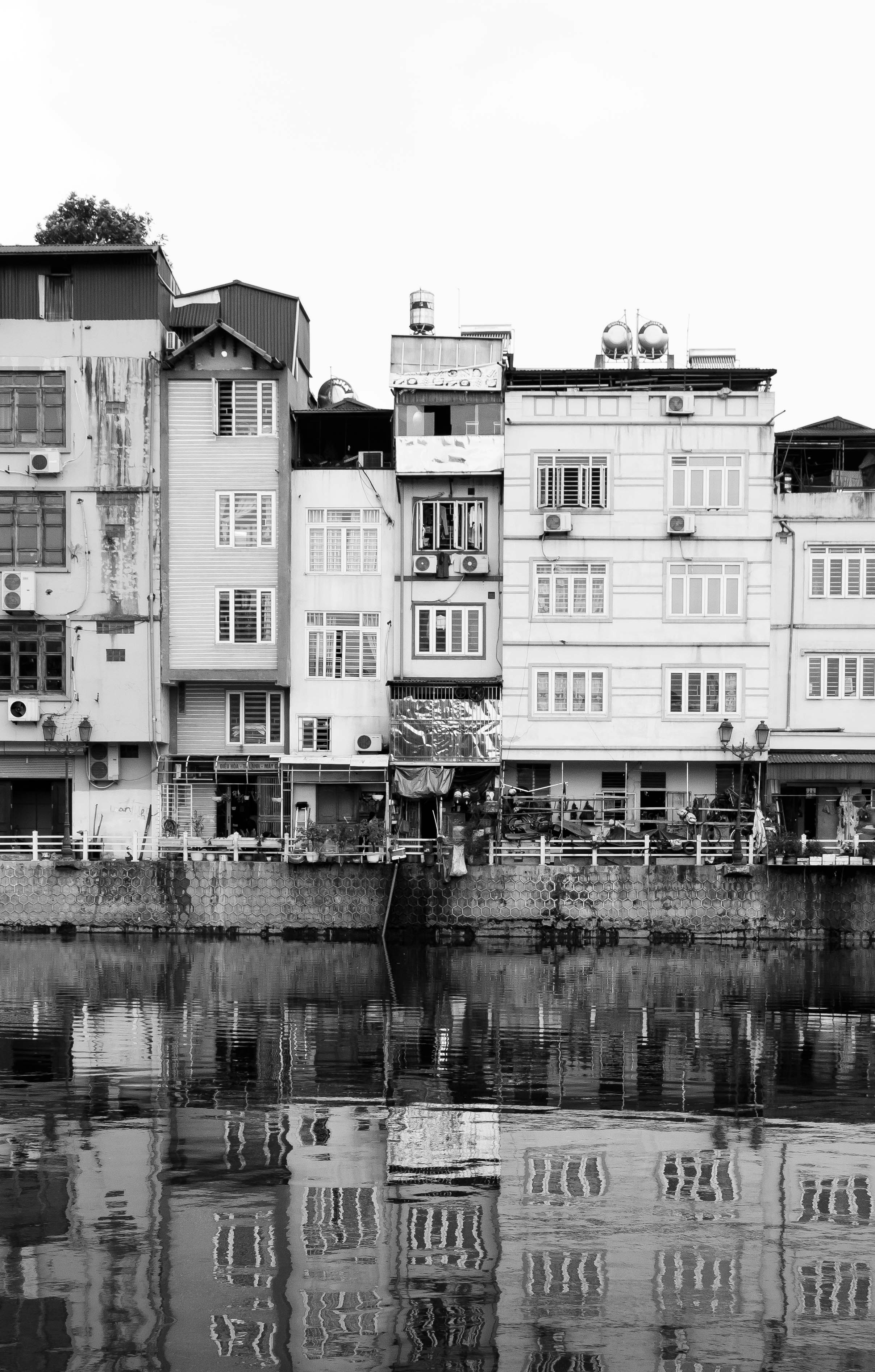 Facade Echoes: A Monochrome Row by the Quiet Canal