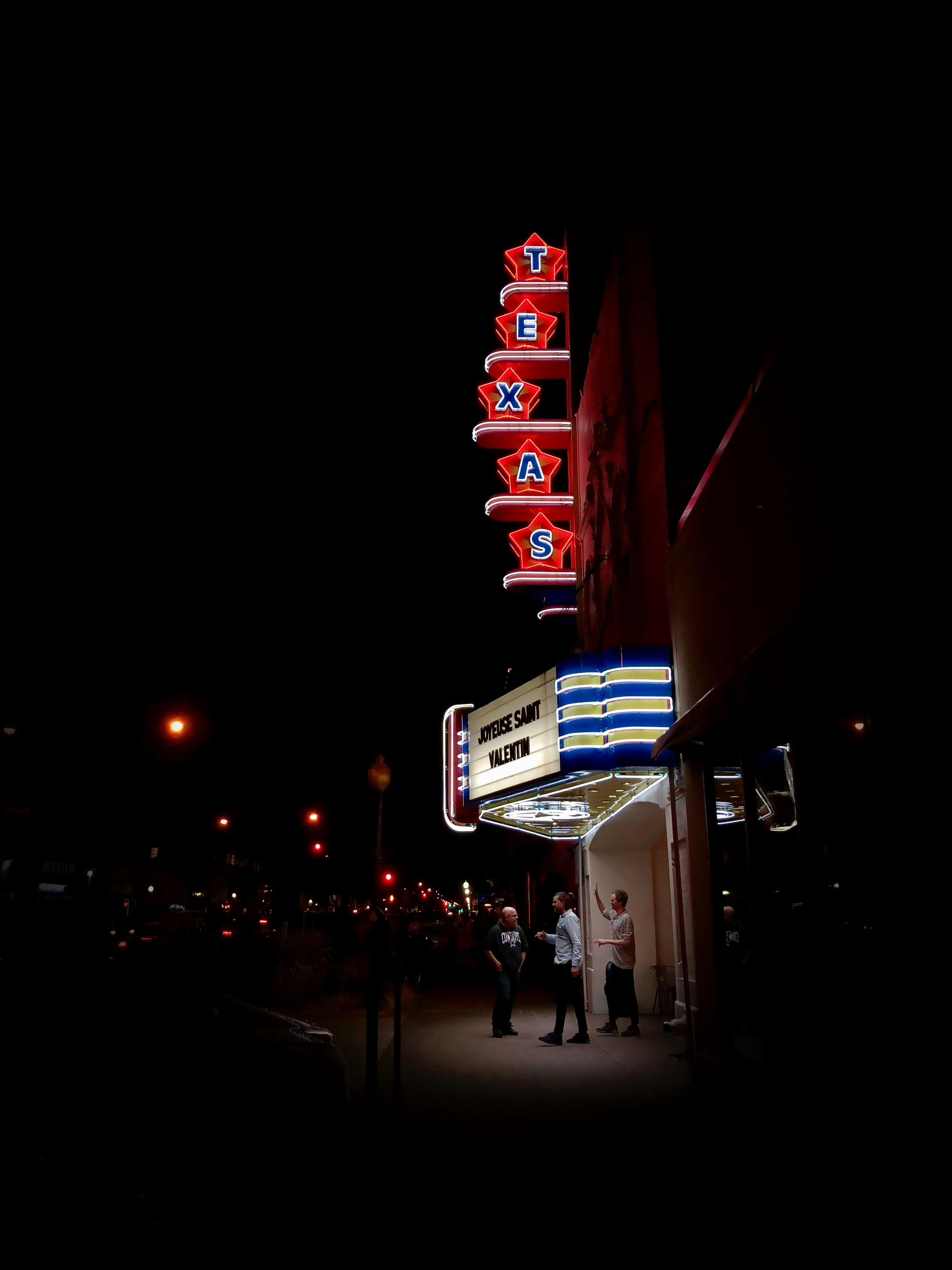 An Evening at the Texas Theatre | person standing near door building