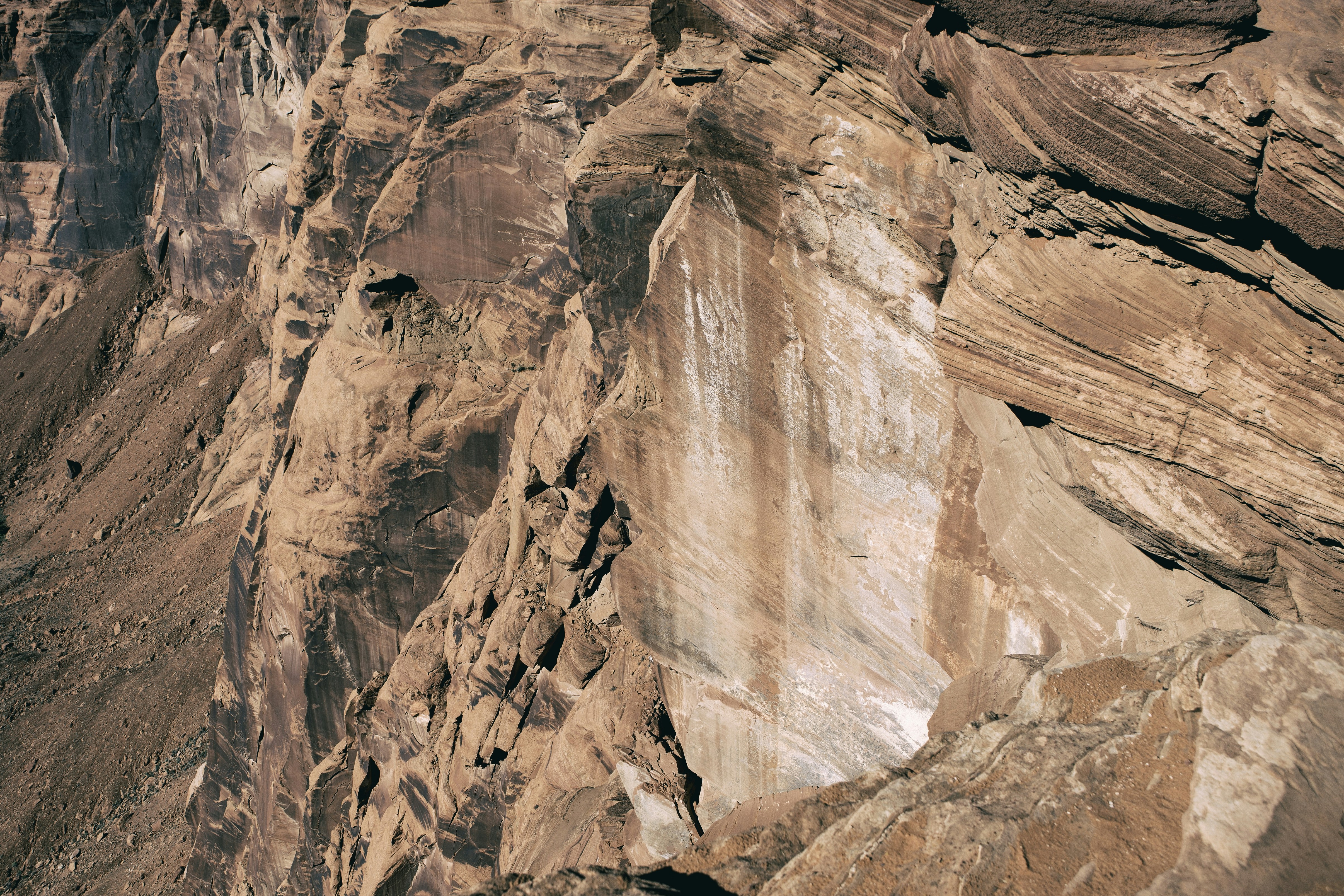 Intricate rock formations reveal the history of erosion and sedimentation in a rugged landscape.
