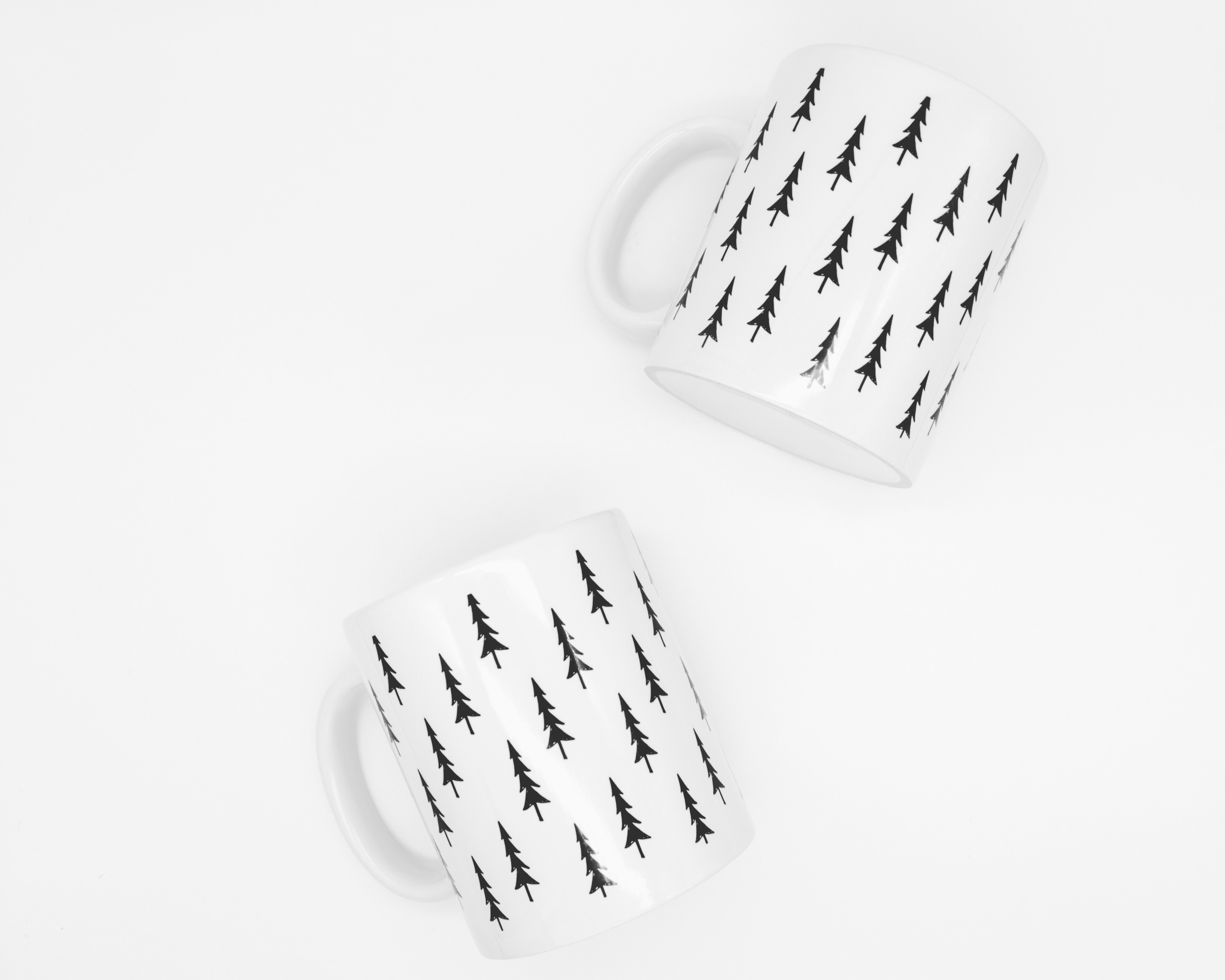 Two white-and-black trees print ceramic mugs photo – Free Minimal Image ...