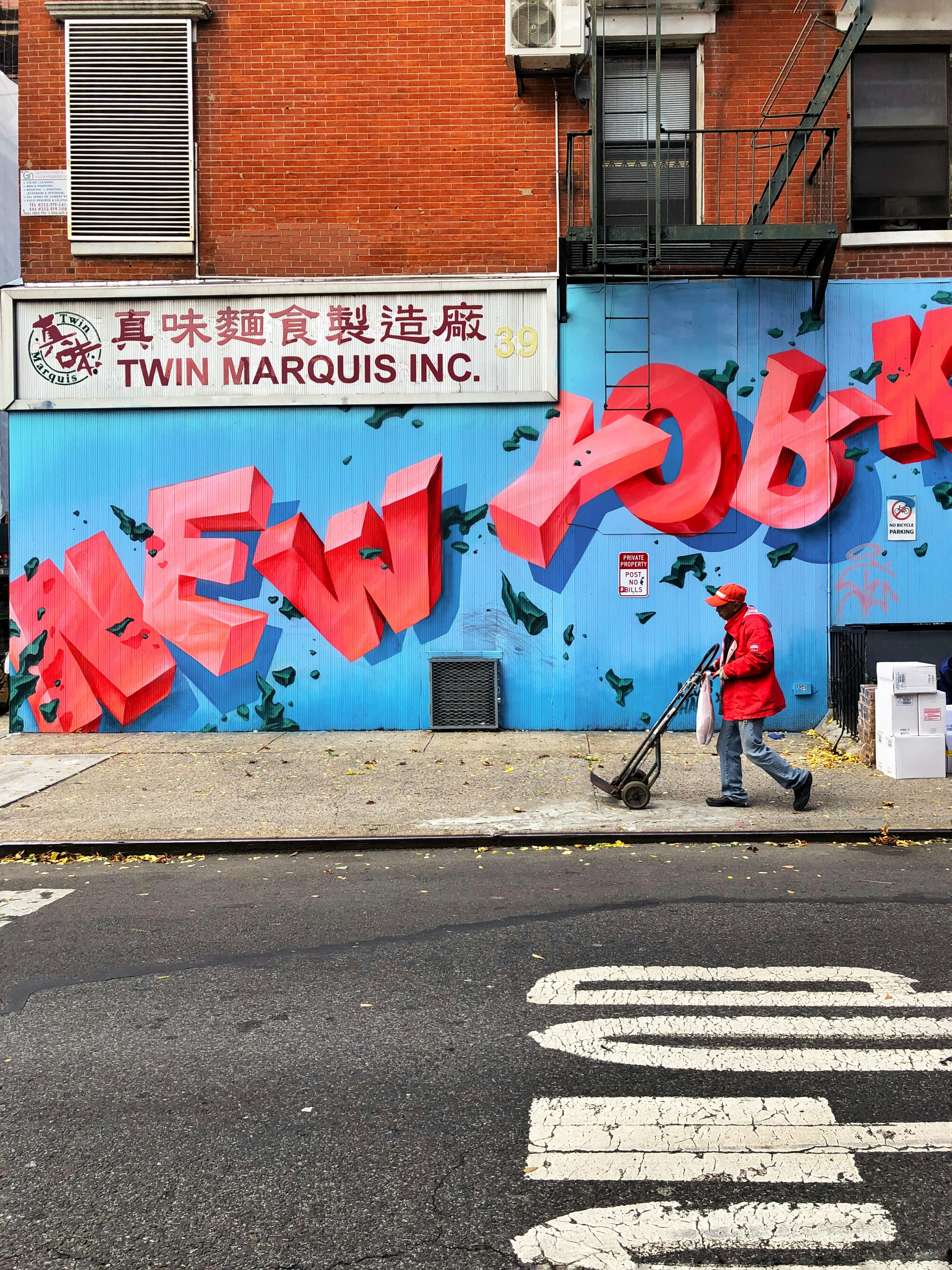Red Jacket Meets a 3D New York Mural