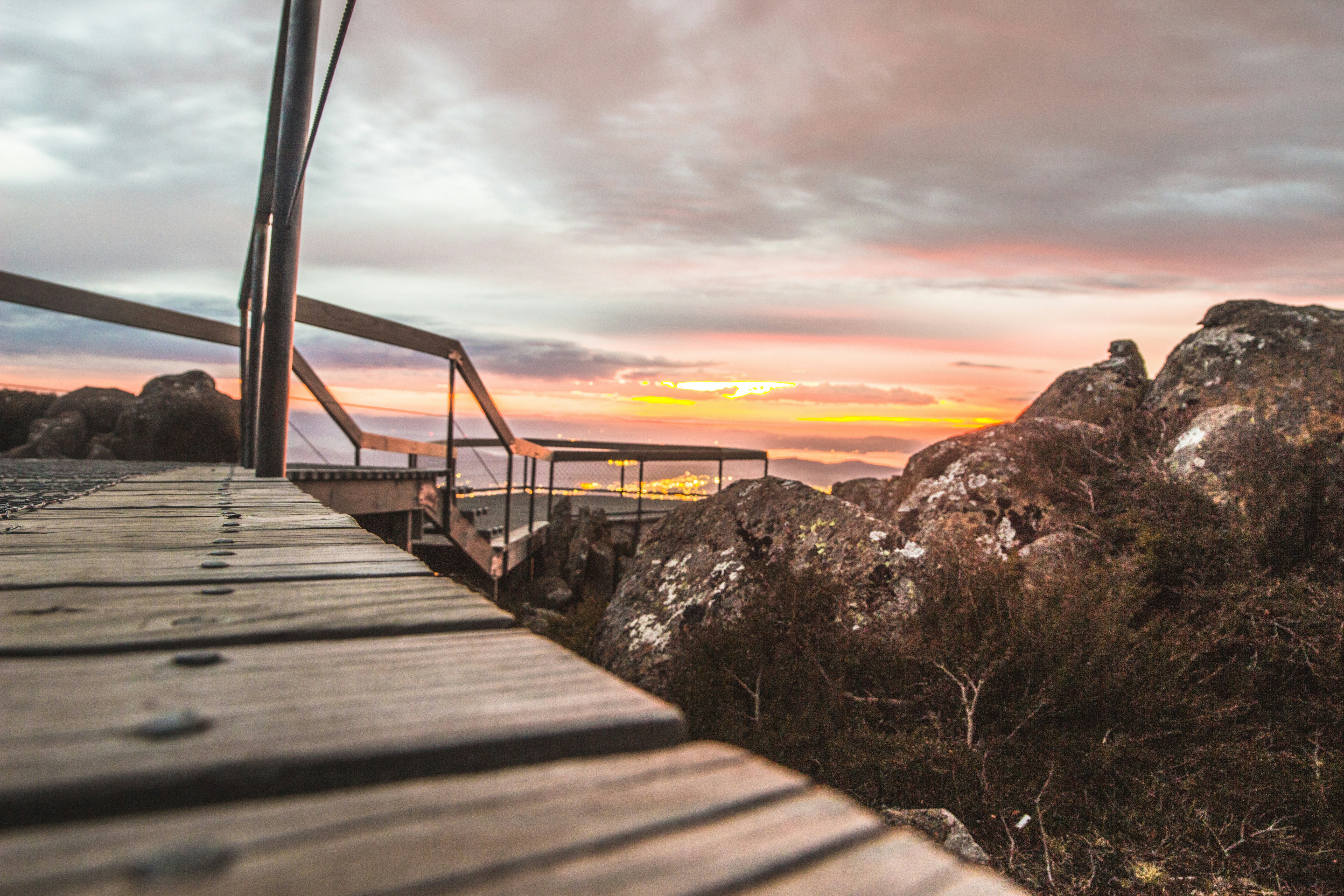 Dock pathway on rock formation photo – Free Sunset Image on Unsplash