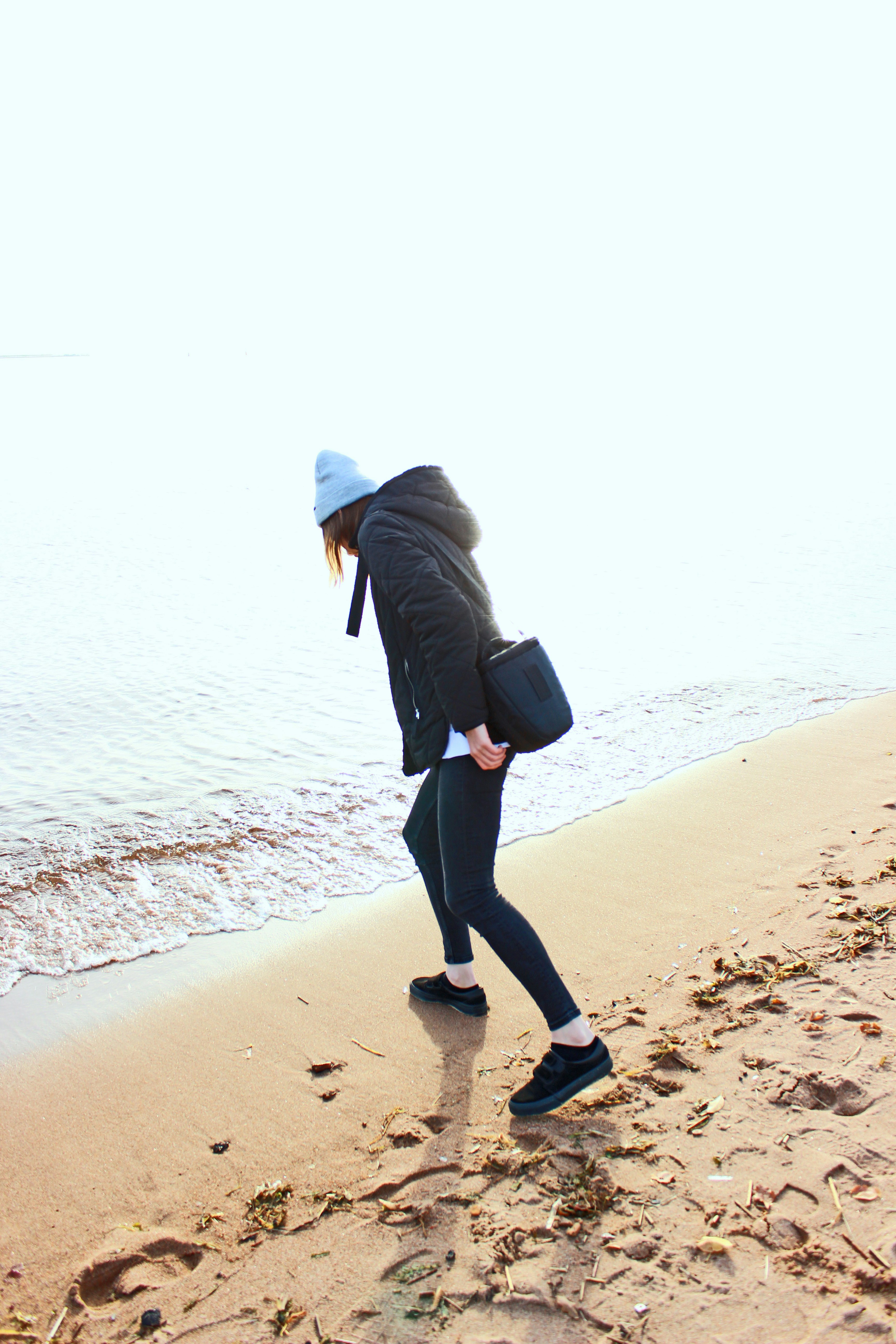 Edgewalker on a sunlit shoreline