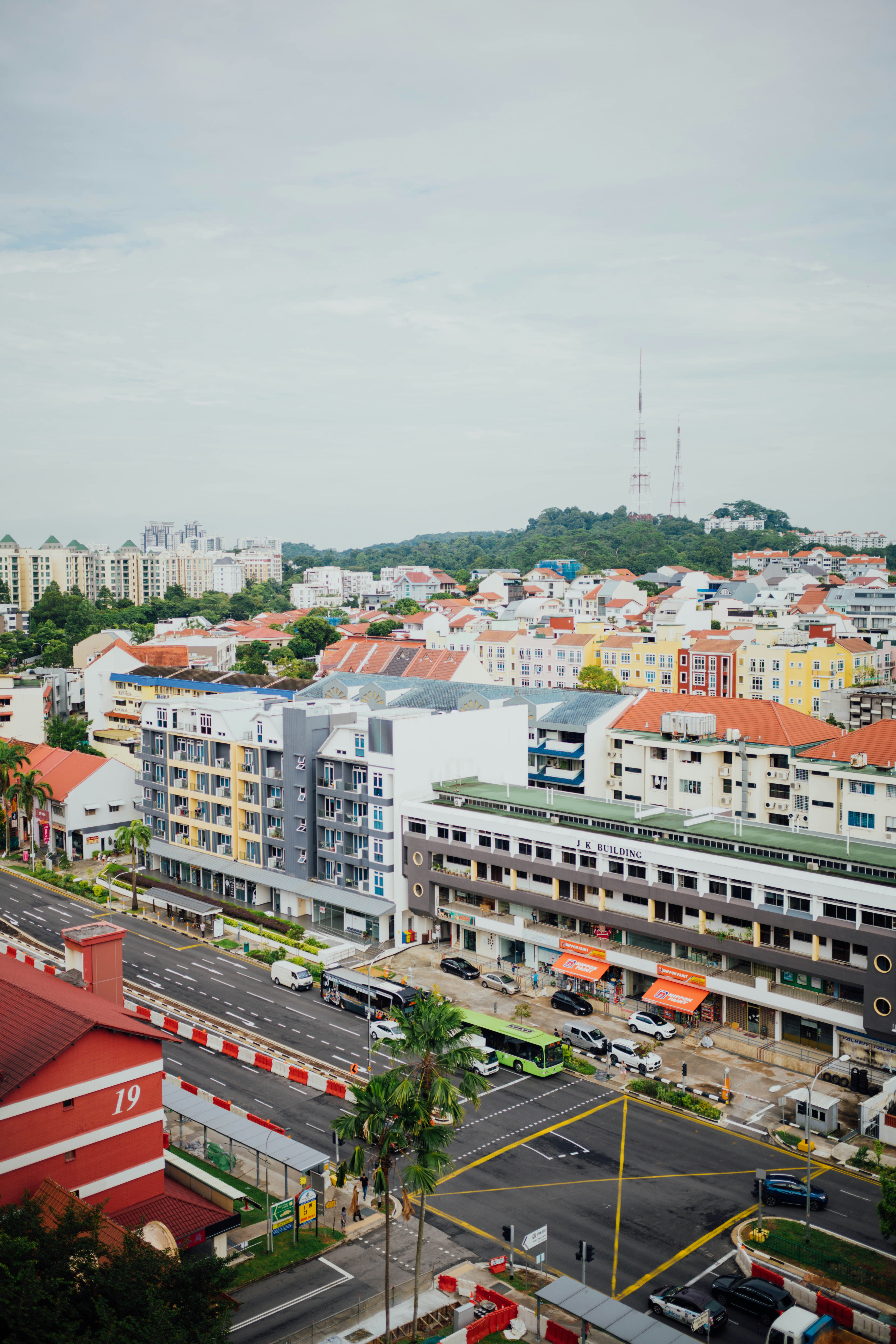 Rooftop Mosaic Over a Colorful Hilltown